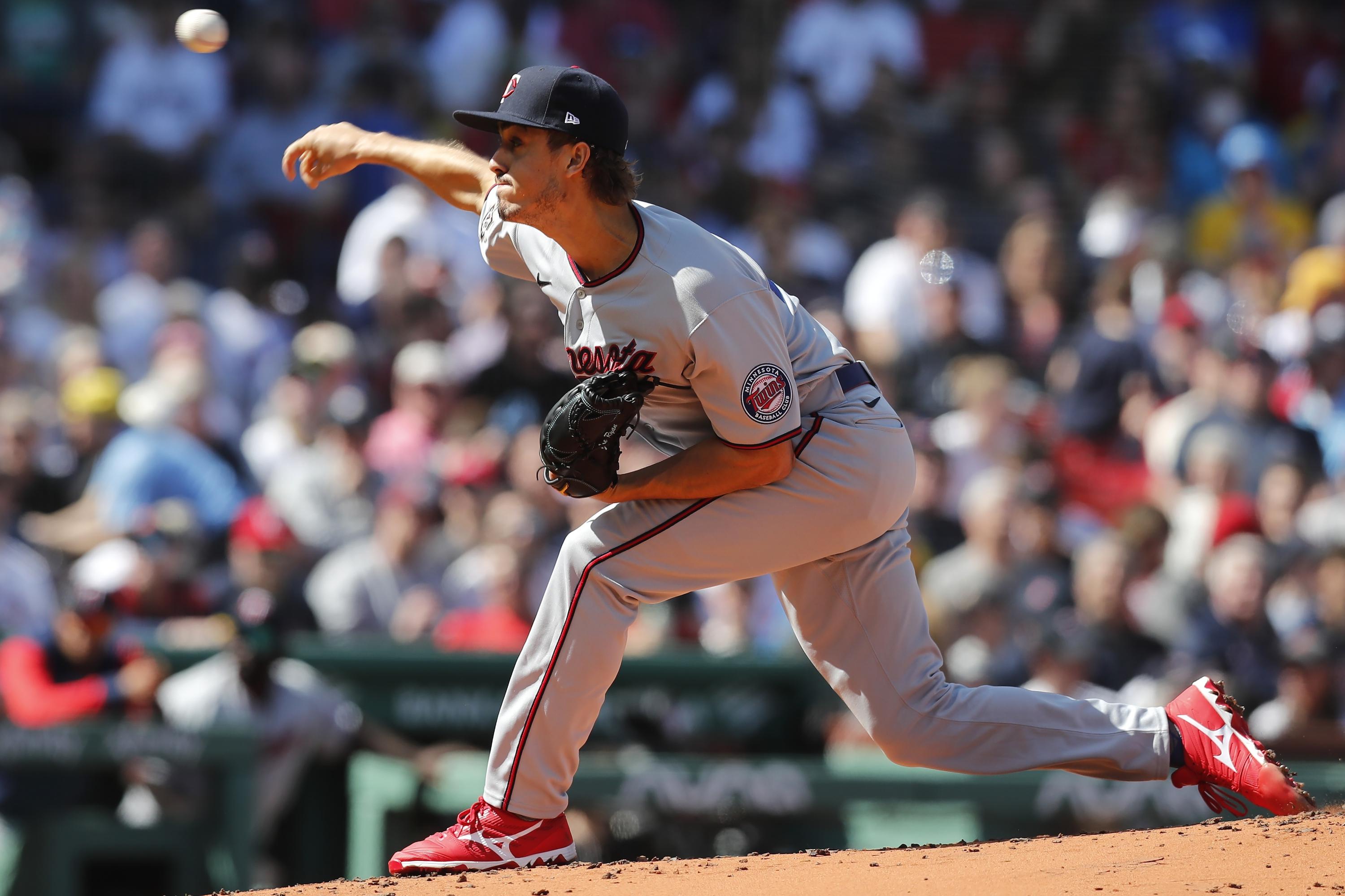 Ryan strong, Twins' bats heat up in Boston's Fenway opener | AP News