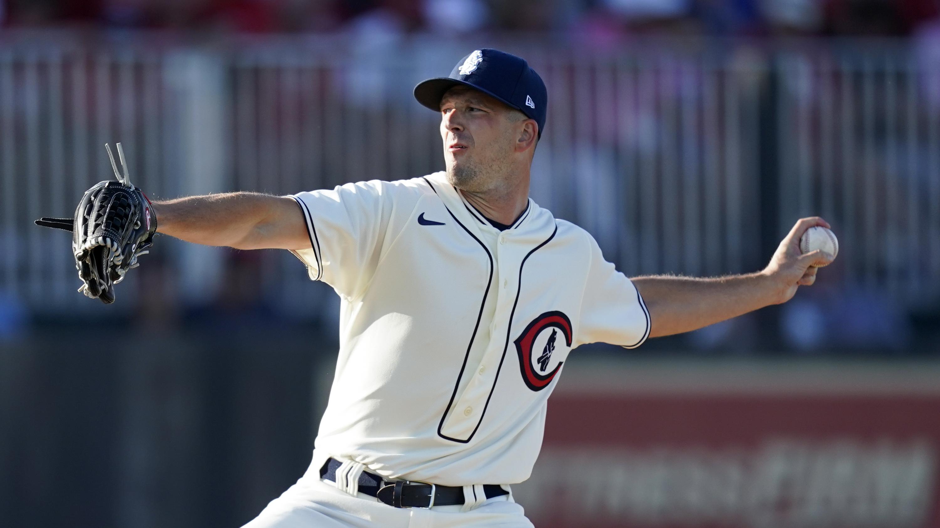 Smyly leads Cubs to win over Reds in "Field of Dreams" game | AP News