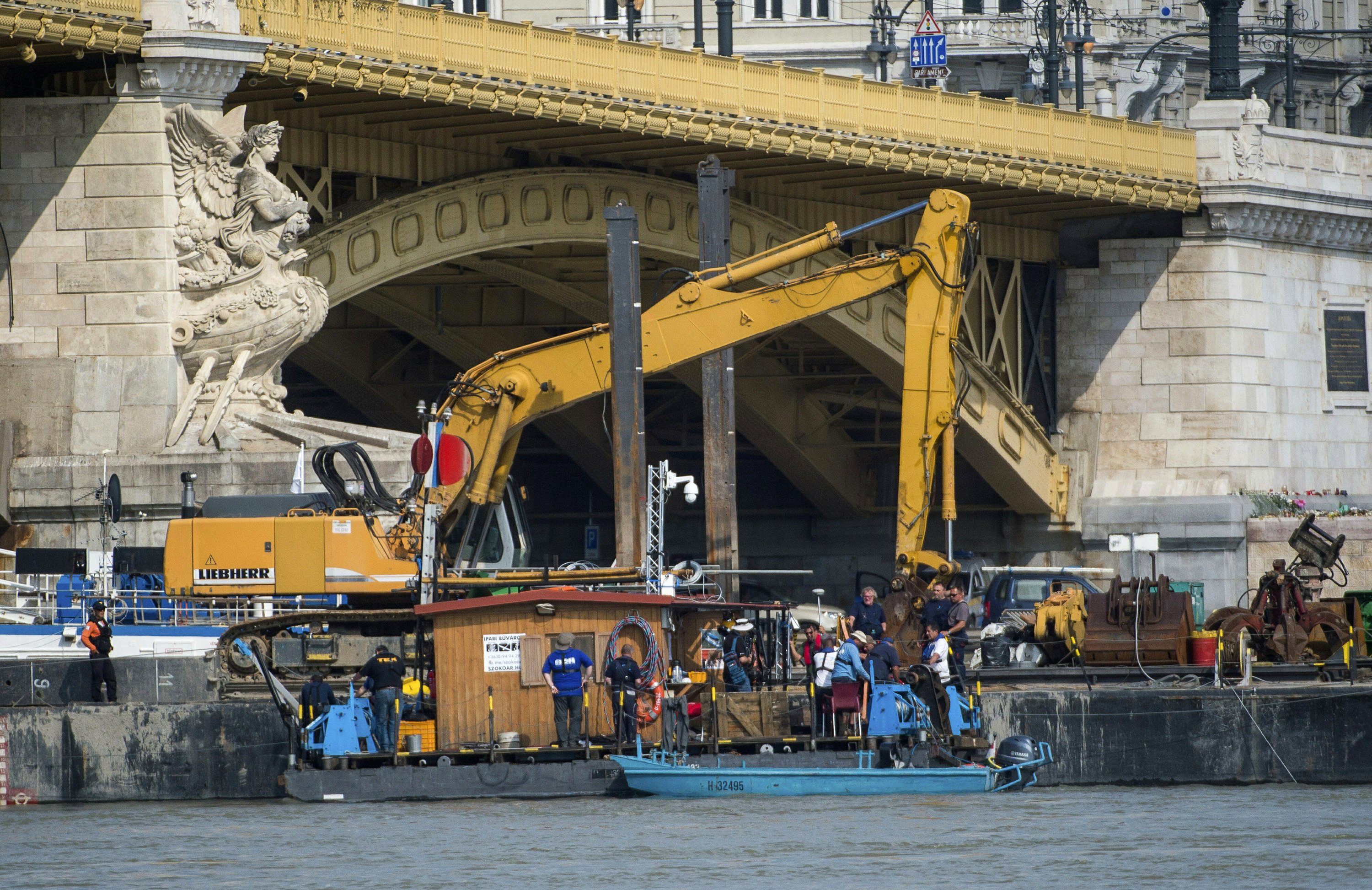 The Latest: Sunken boat unlikely to be raised before Tuesday | AP News