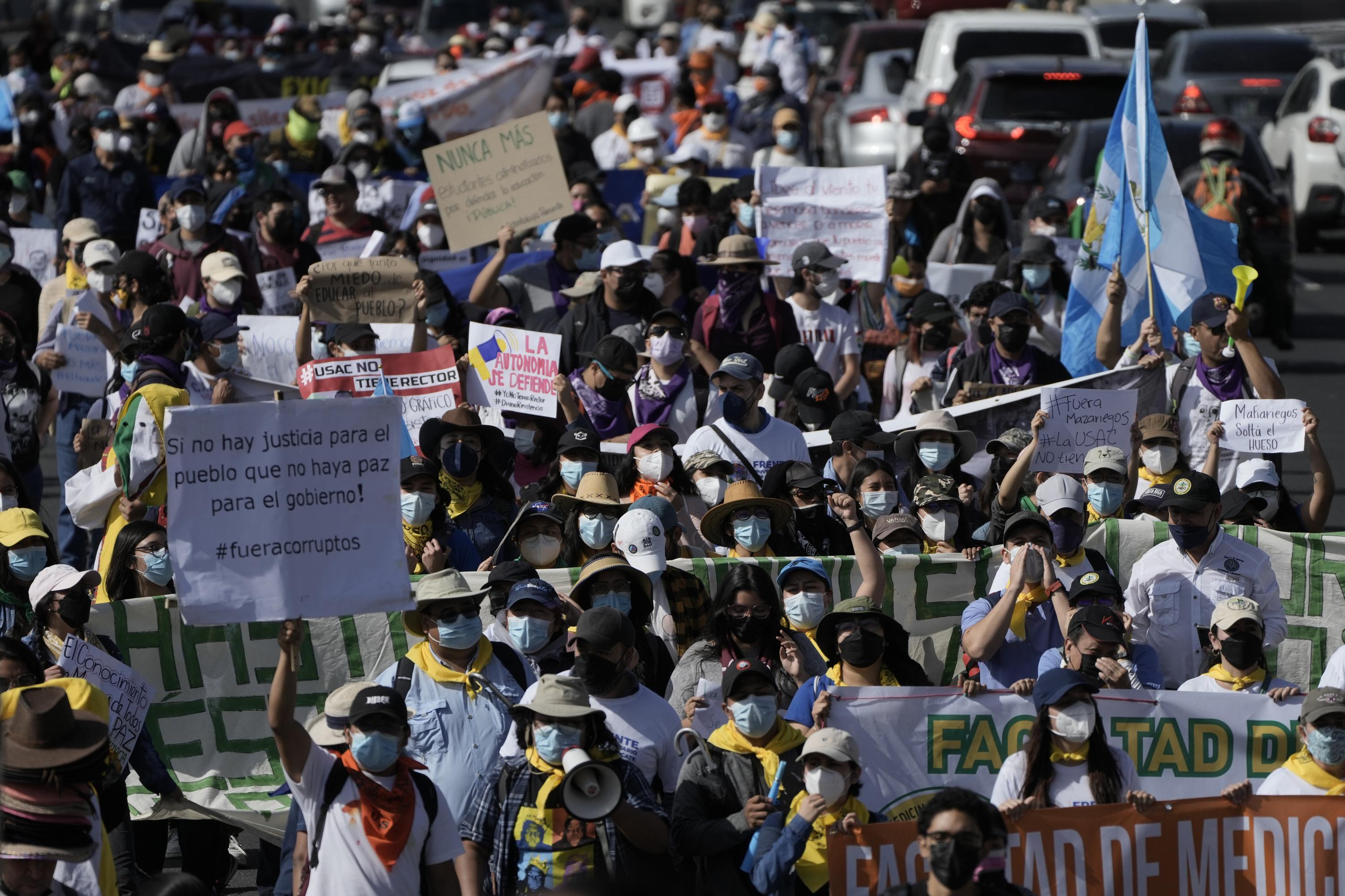 Guatemalans march in protest of corruption, cost of living | AP News