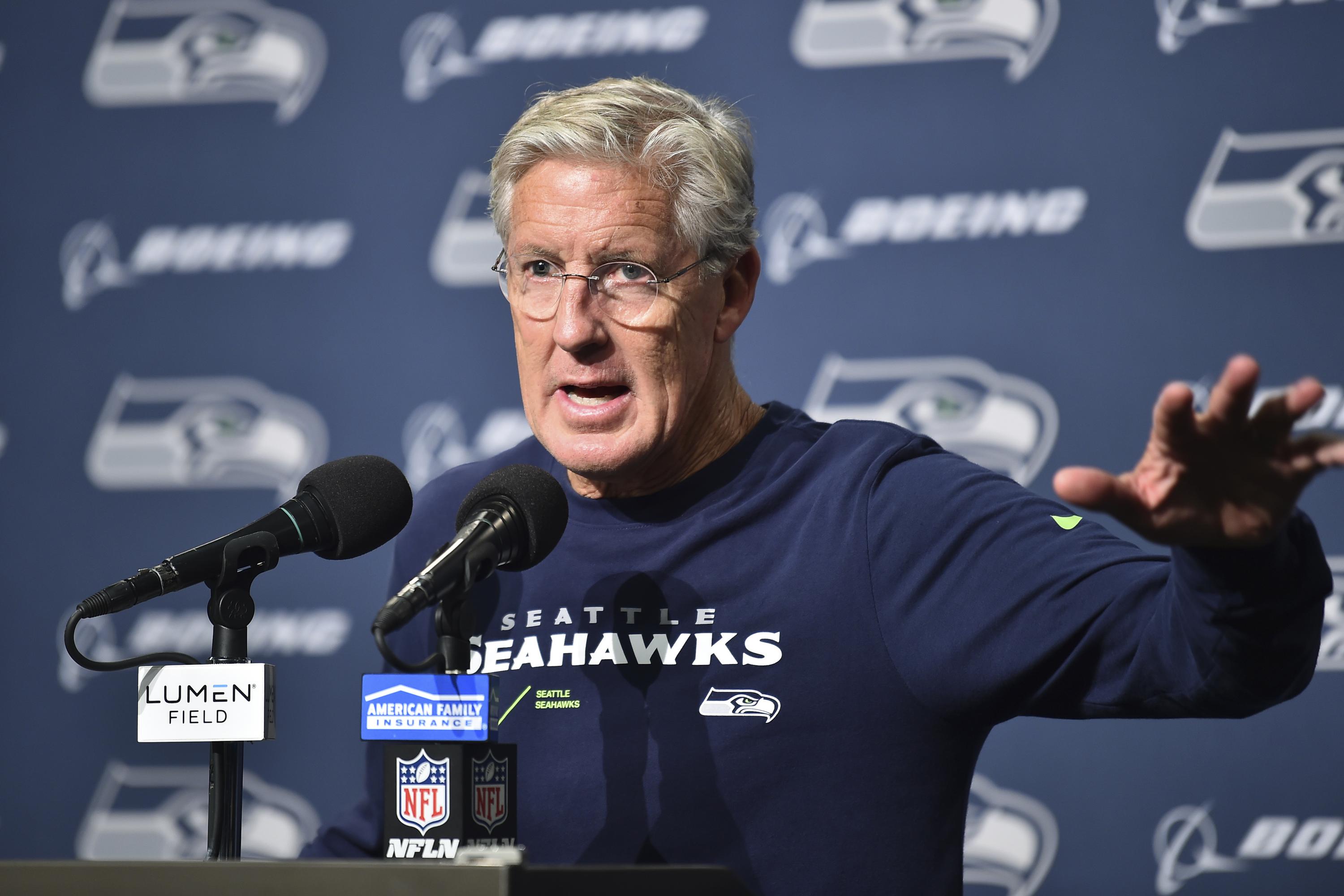Seahawks hope to be creating foundation despite QB question | AP News