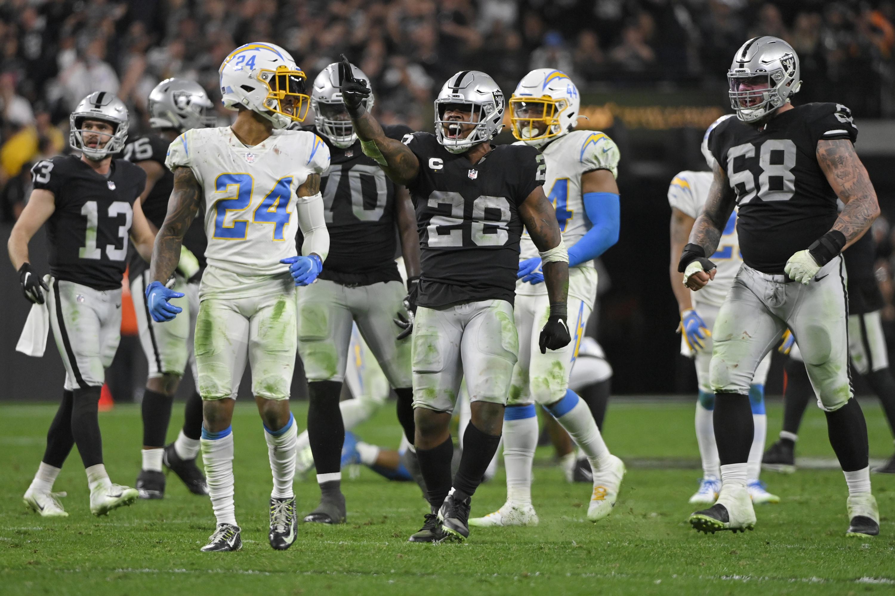 Raiders' Carr after clinching playoffs: 'Job is not done' | AP News