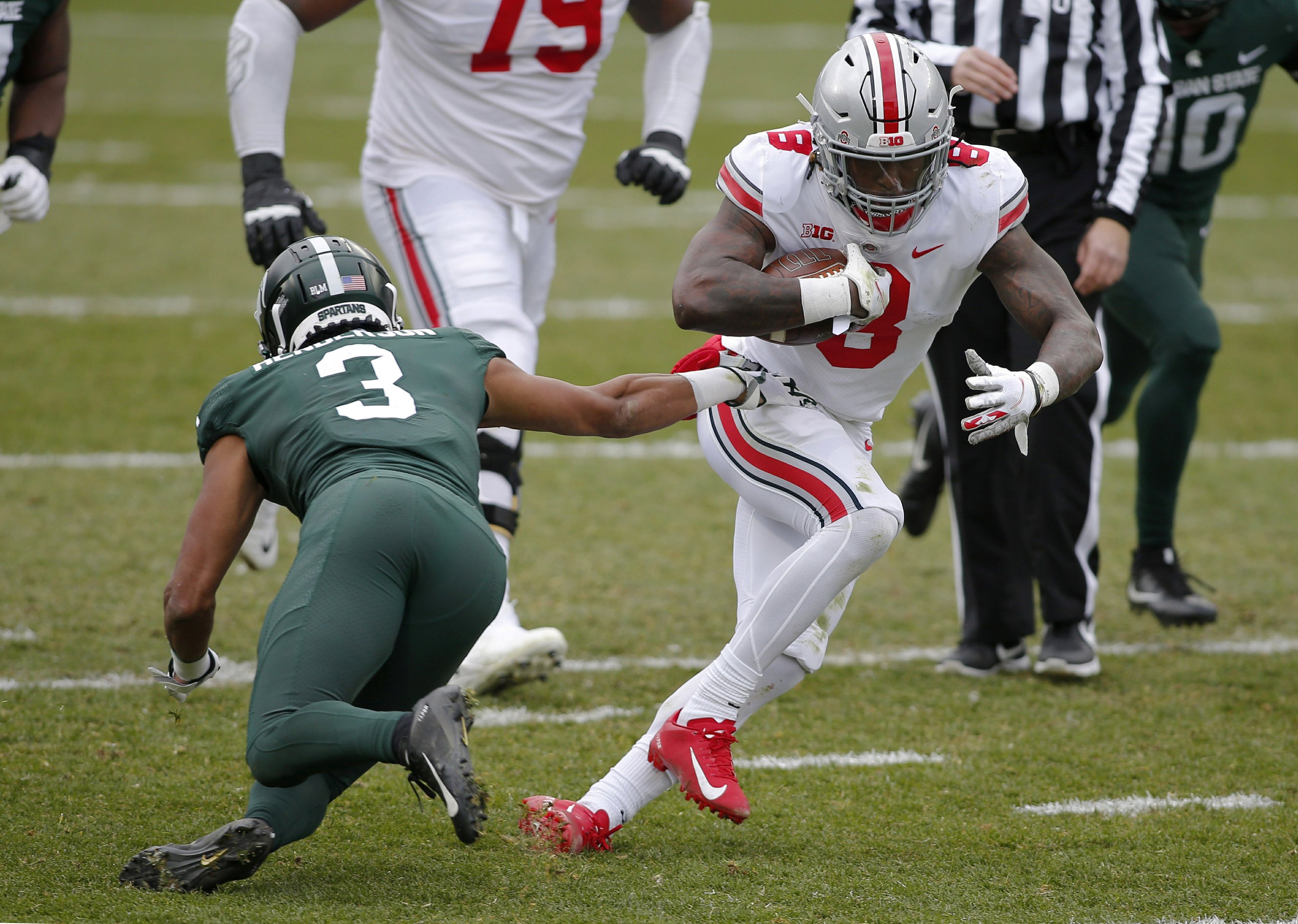 No. 3 Buckeyes await word on 'The Game' with plenty at stake | AP News