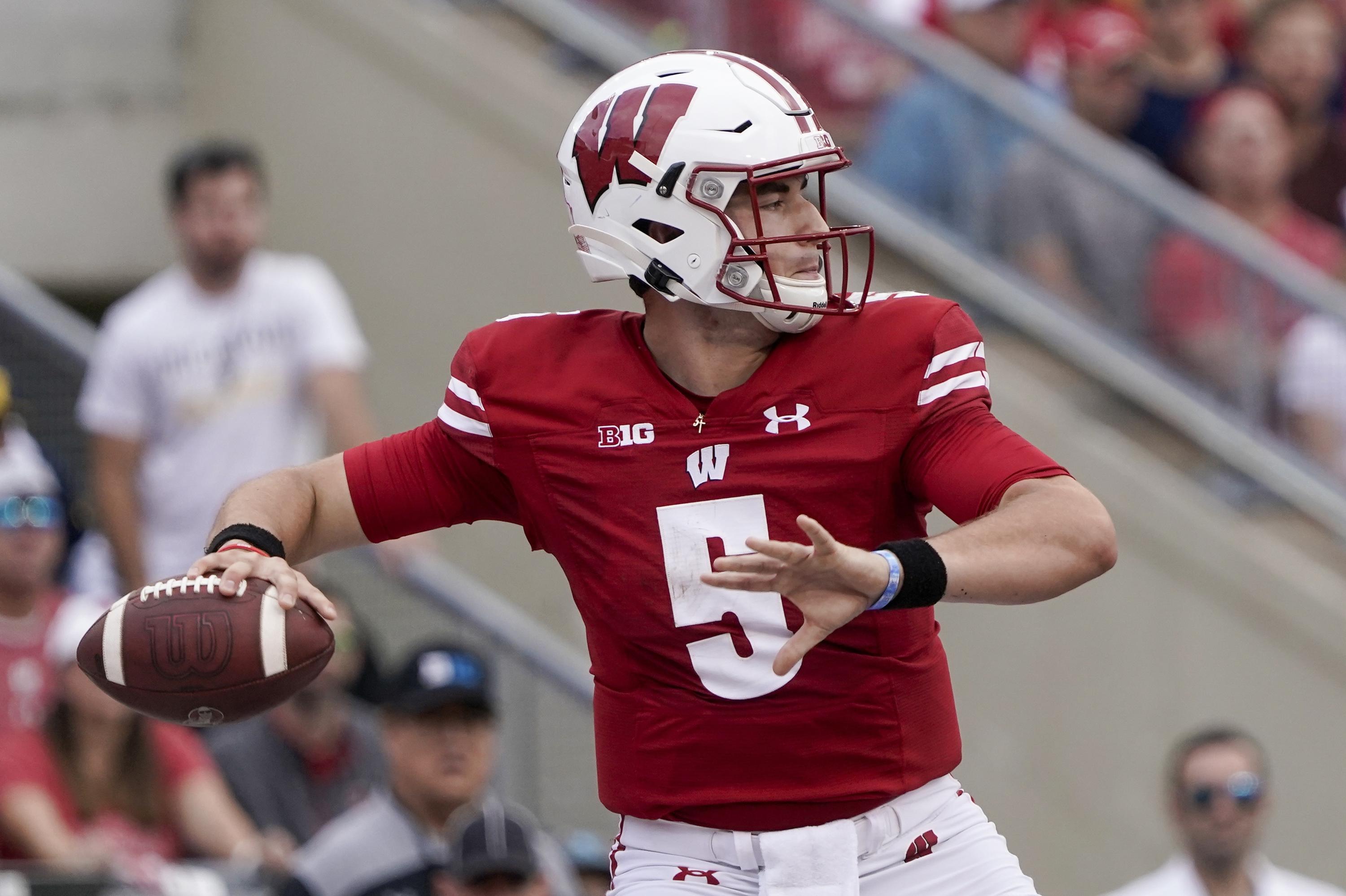 Wisconsin QB Graham Mertz leaves with chest injury | AP News