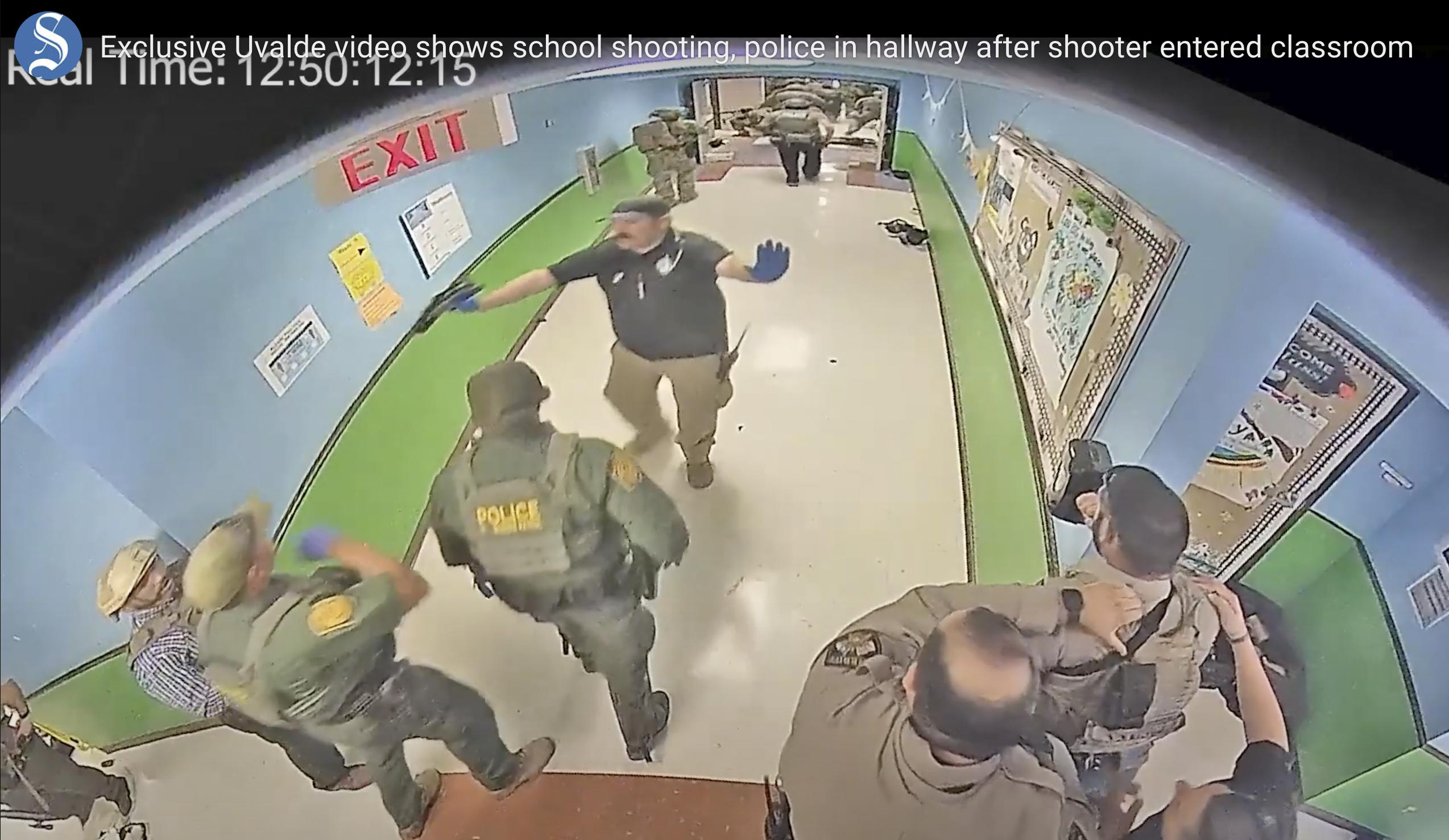 Uvalde's new anguish: Video shows police waiting in school | AP News