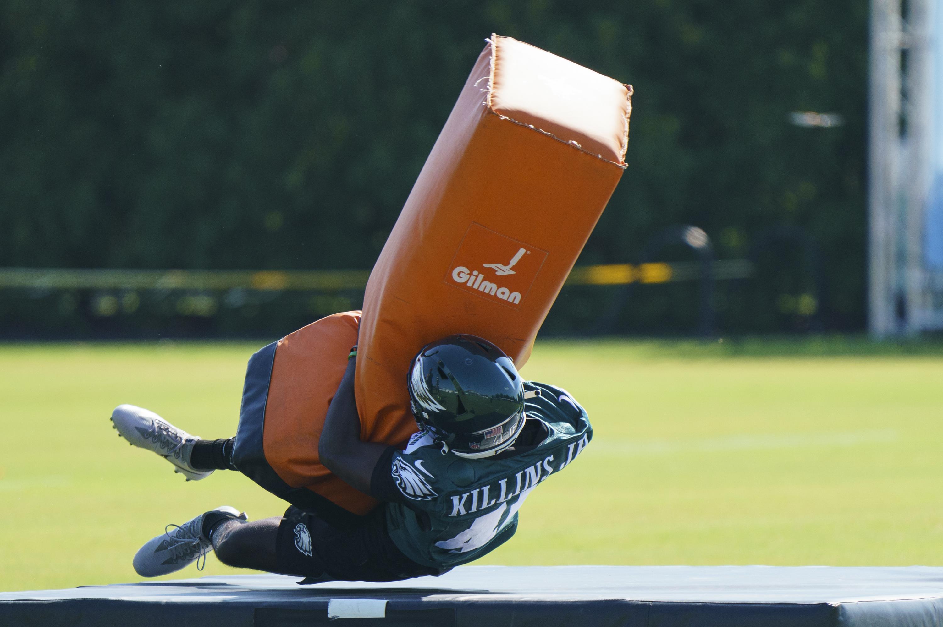 Banged-up Broncos sign running back Adrian Killins | AP News