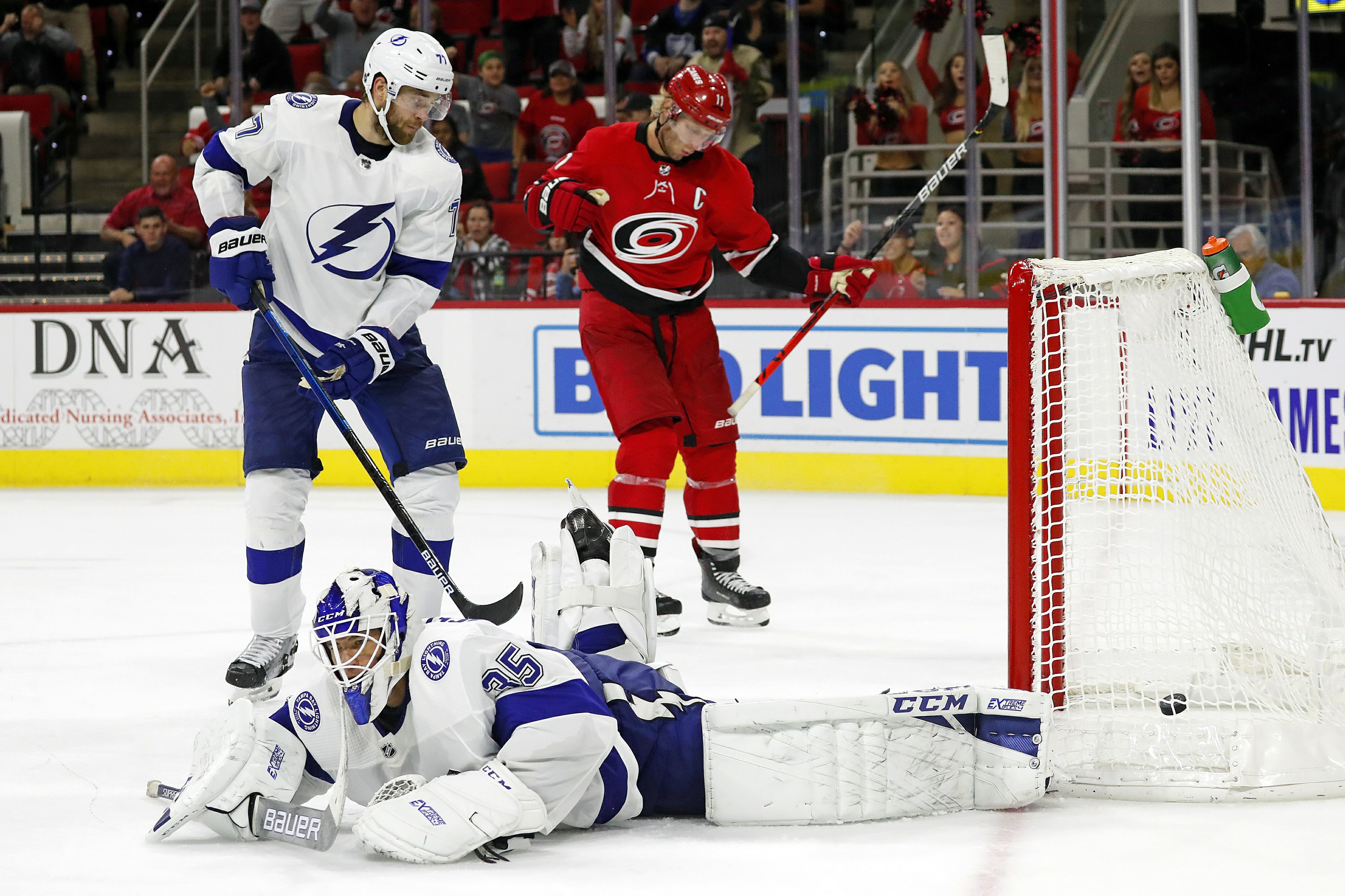 Hurricanes rally to beat Lightning in overtime | AP News