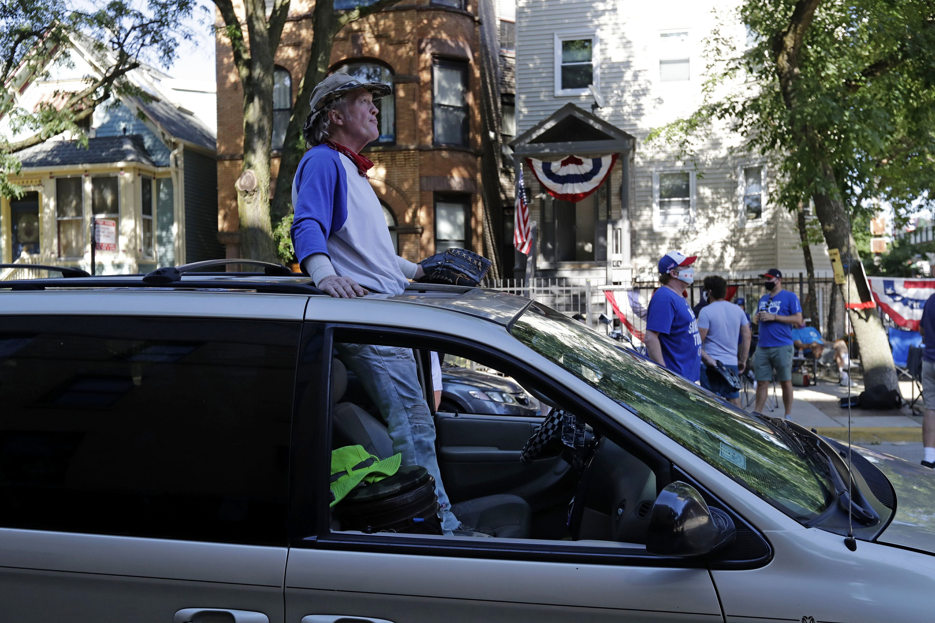 "We love baseball" Wrigley ballhawks stay on during pandemic | AP News