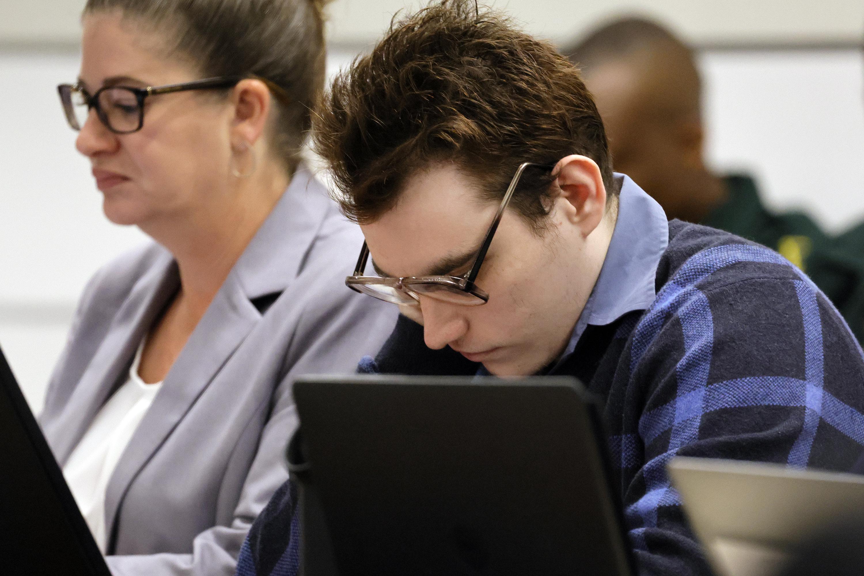 Testimony: School shooter witnessed dad's death at age 5 | AP News