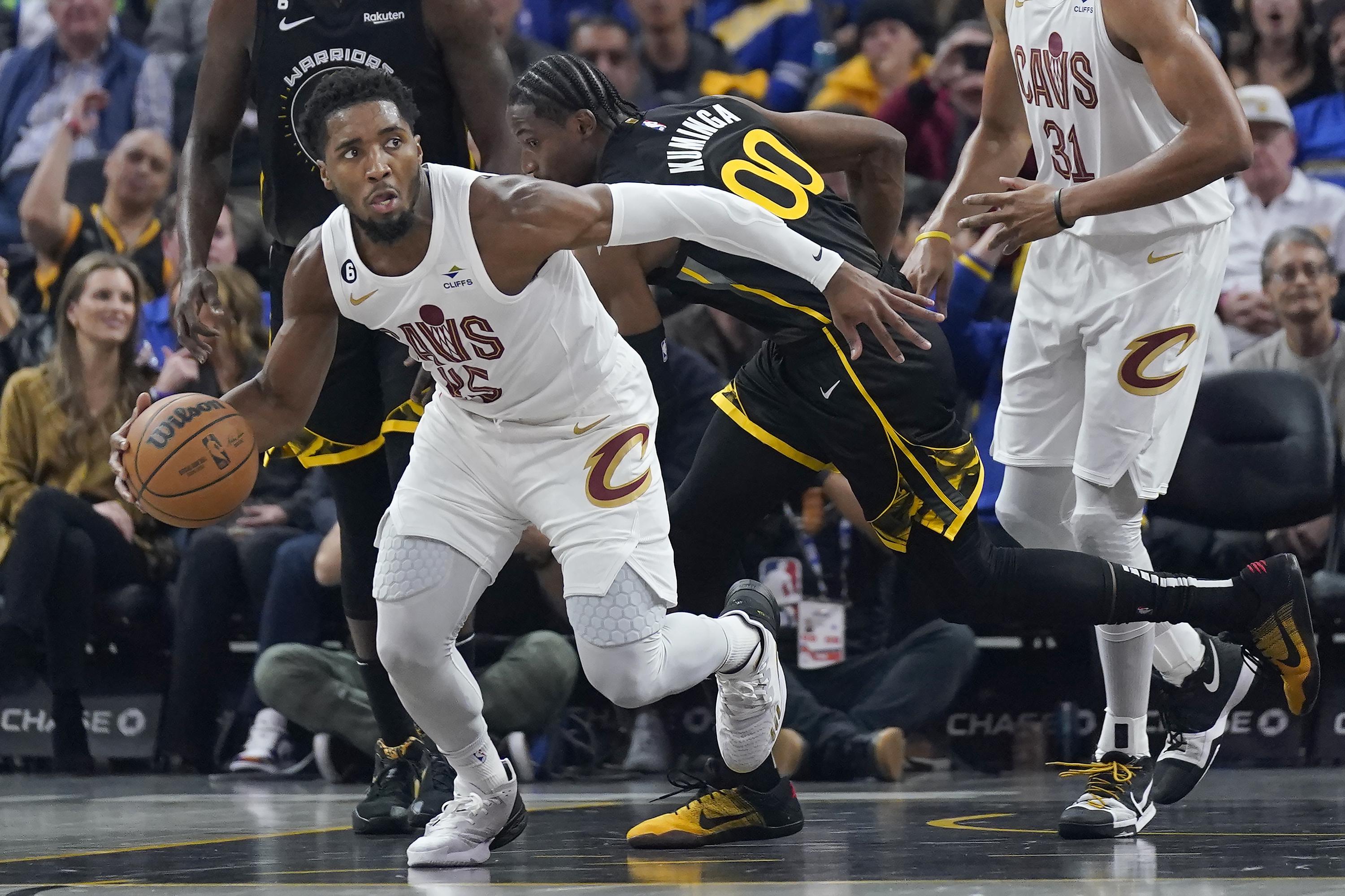 All-Stars Mitchell, Allen miss Cavs' game against Wolves | AP News