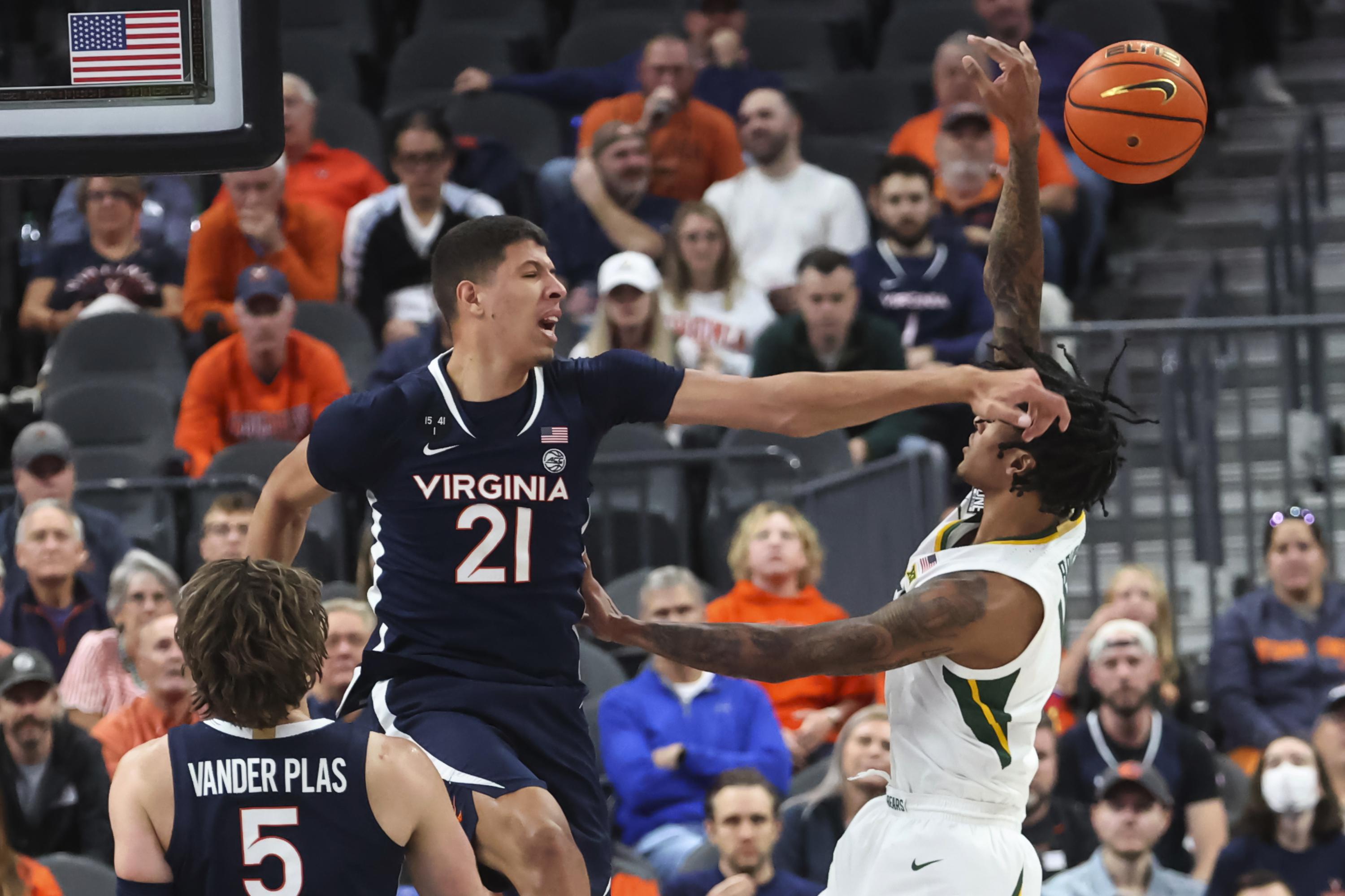 No. 16 Virginia honors shooting victims, beats No. 5 Baylor | AP News