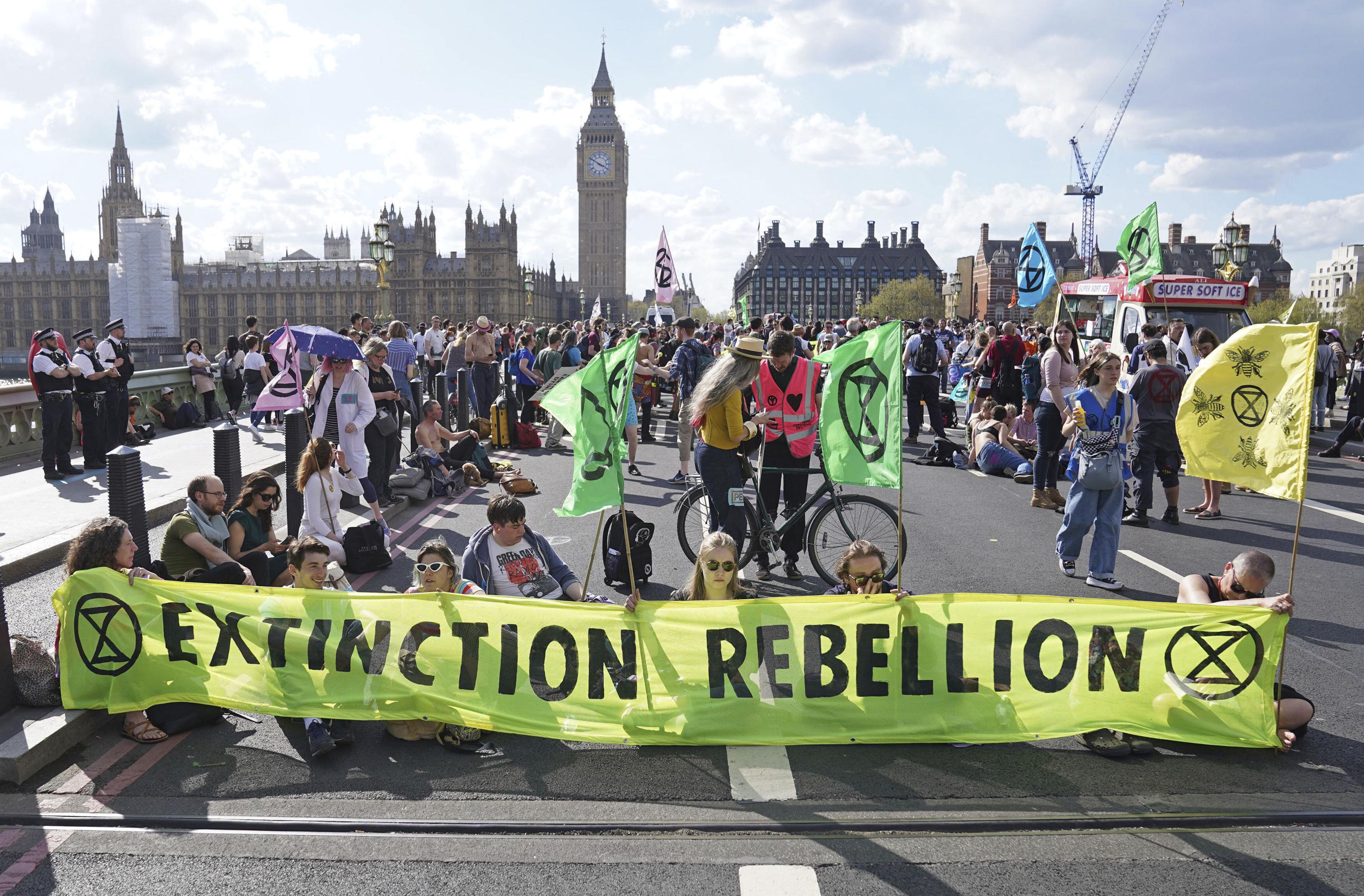 Climate activists block London bridges, UK oil terminals | AP News