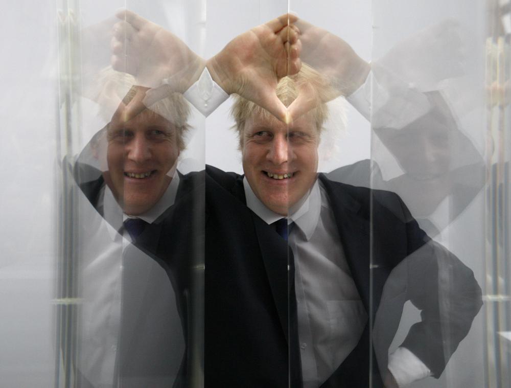 AP Photo of Boris Johnson in some sort of hall of mirrors like setup : r/confusing_perspective
