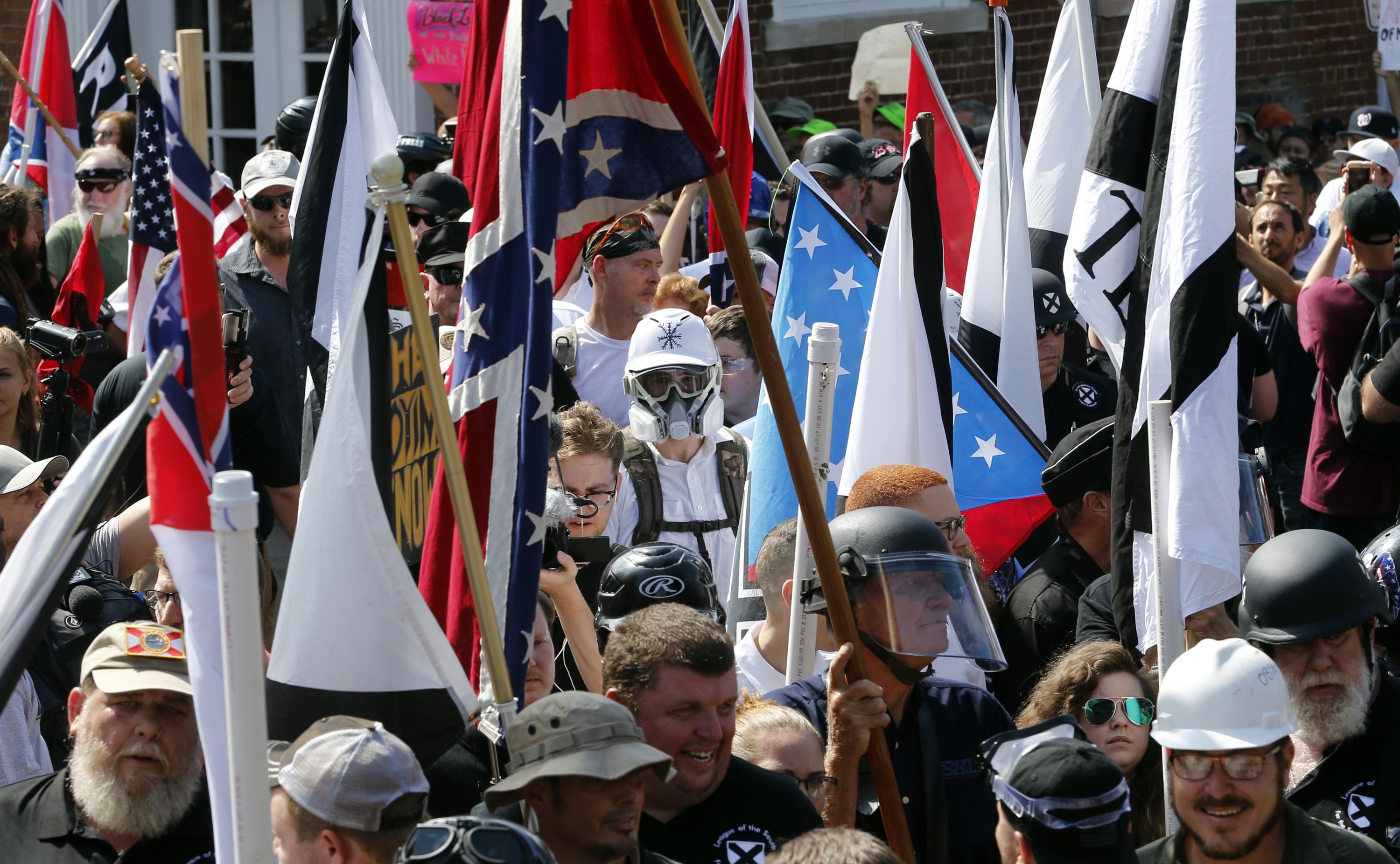 Ex-cop decertified for alleged role in Charlottesville rally | AP News