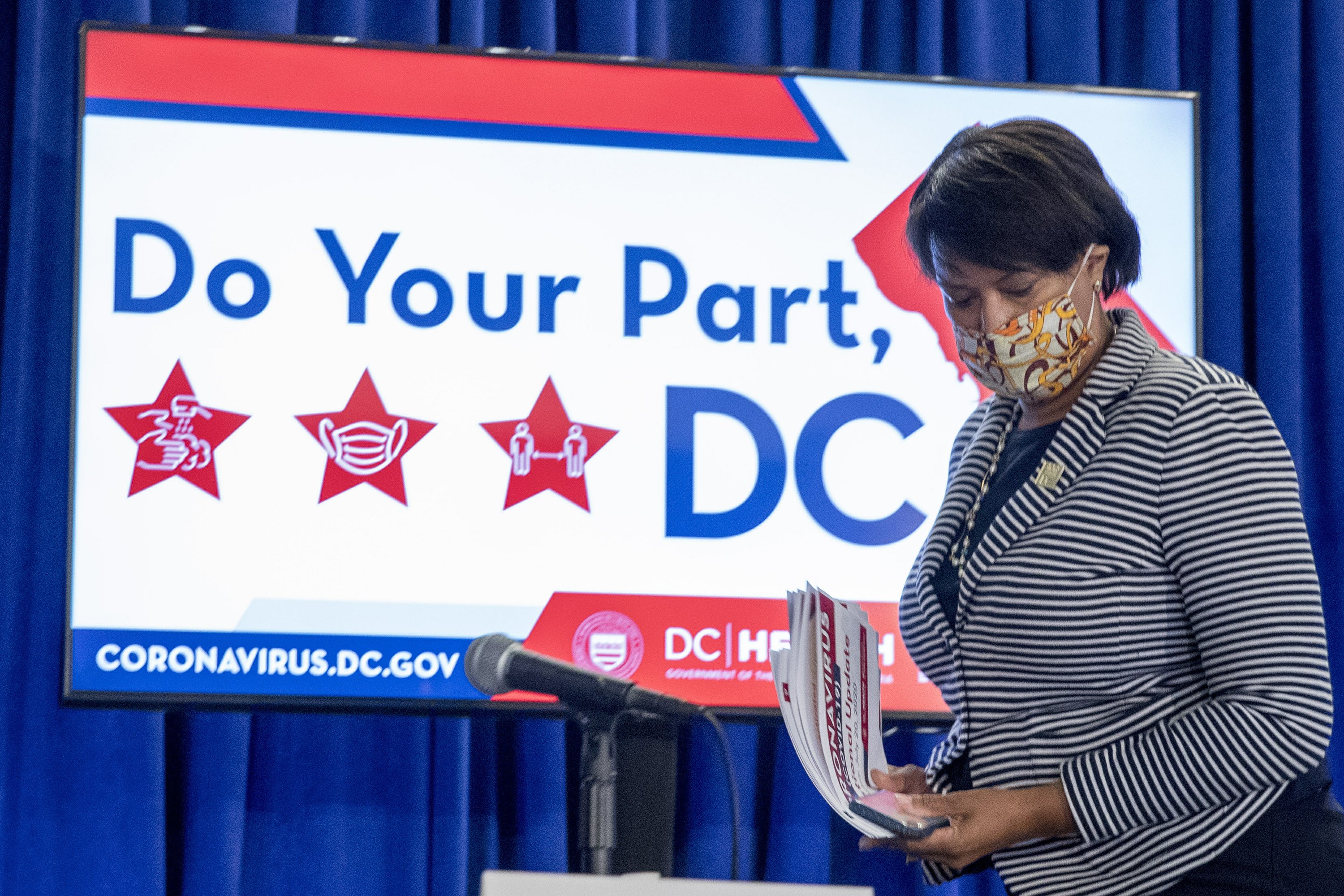 DC mayor orders mandatory masks as infections rise again | AP News