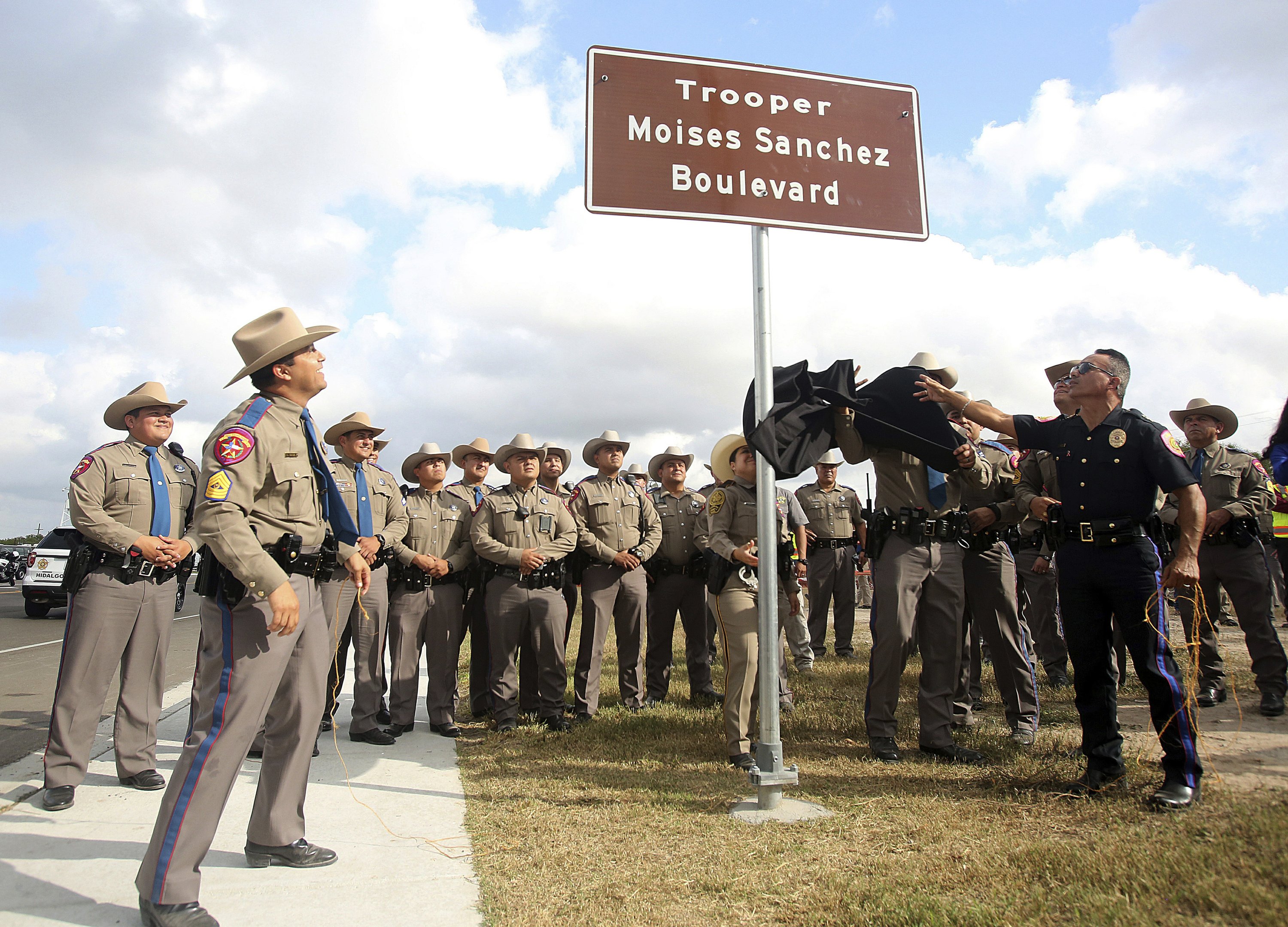 Part of South Texas street named for slain state trooper | AP News