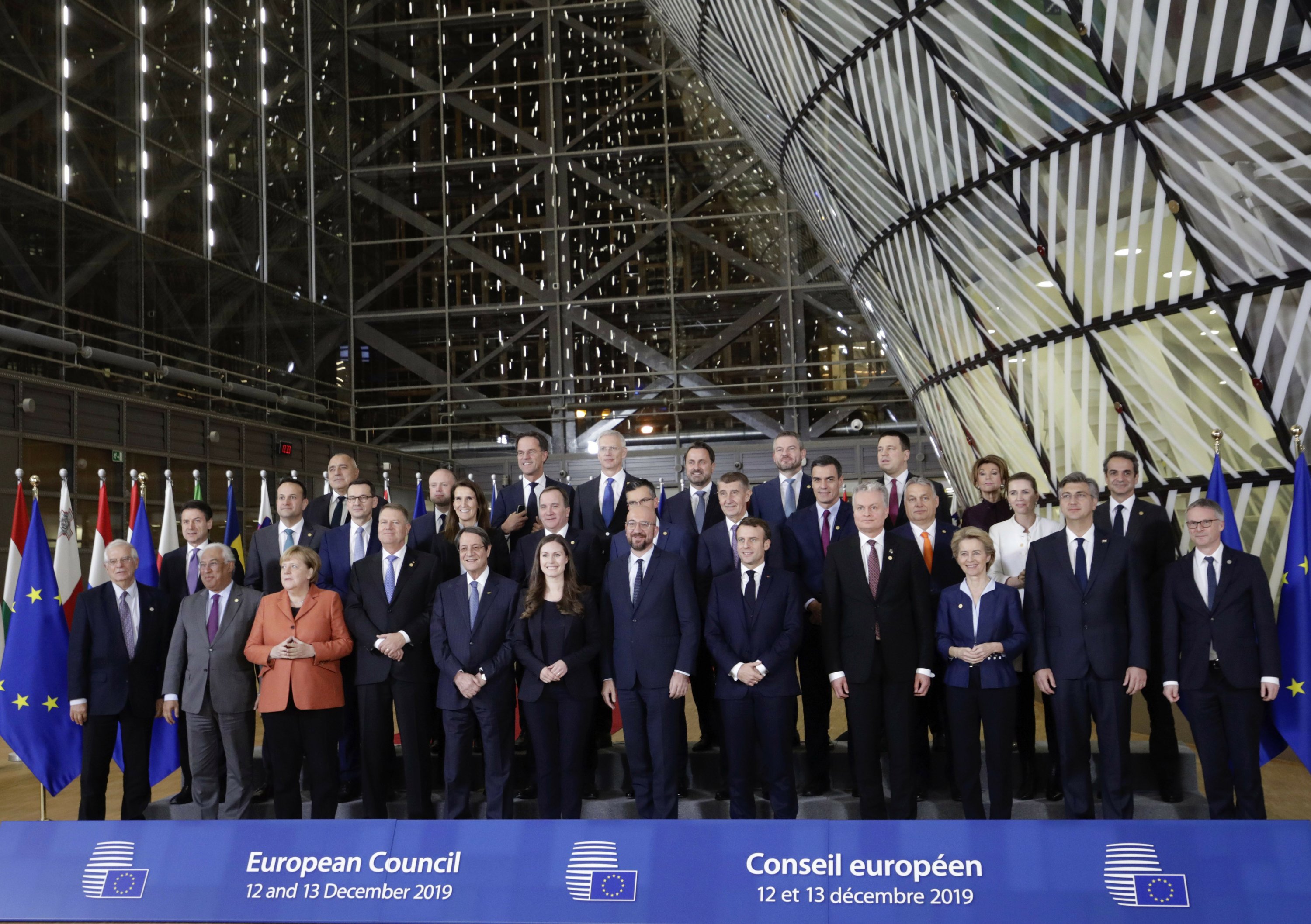 EU leaders show brief unity in family photo, without UK | AP News