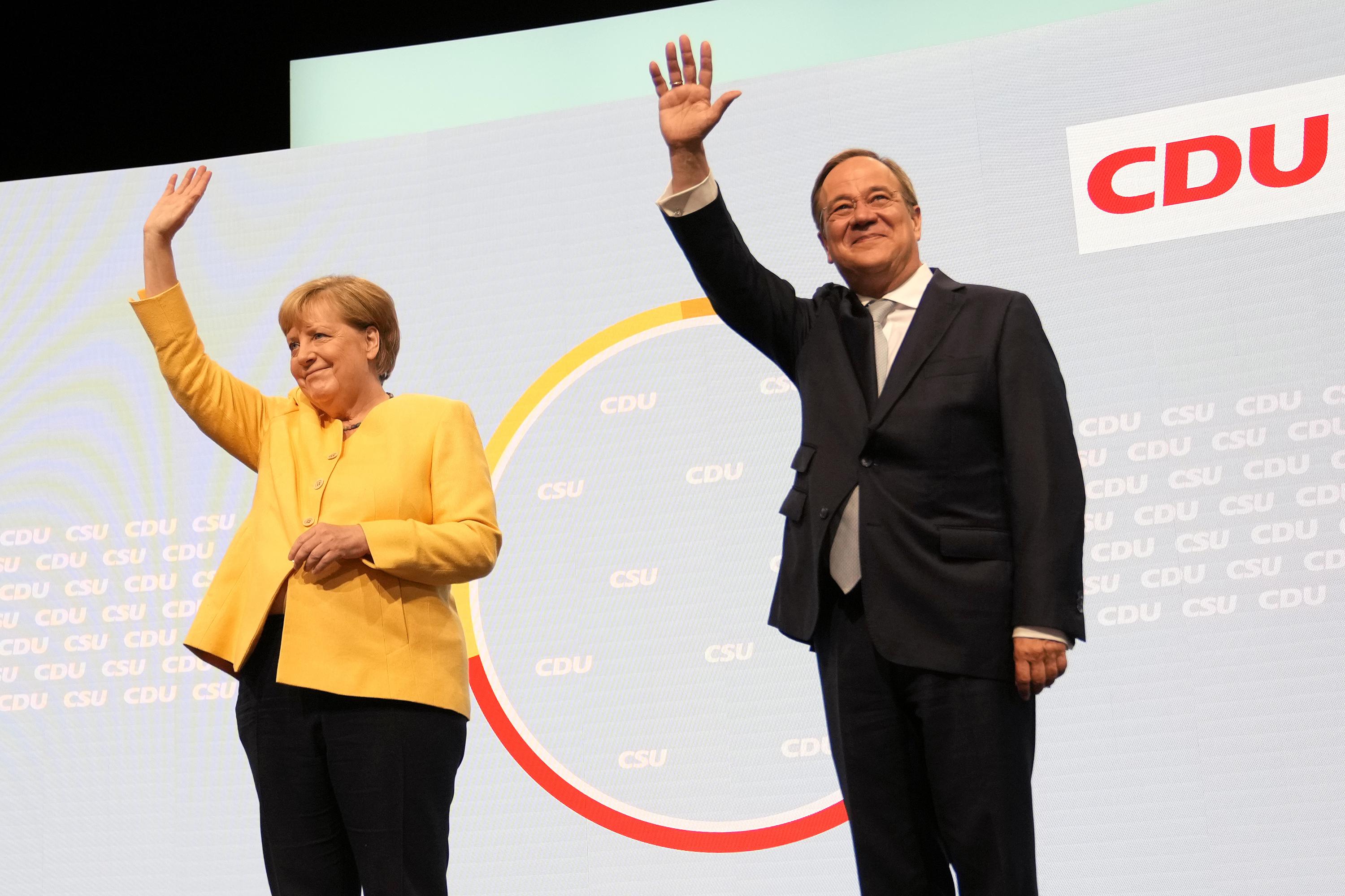Merkel's bloc steps up German election fight amid poll sag | AP News
