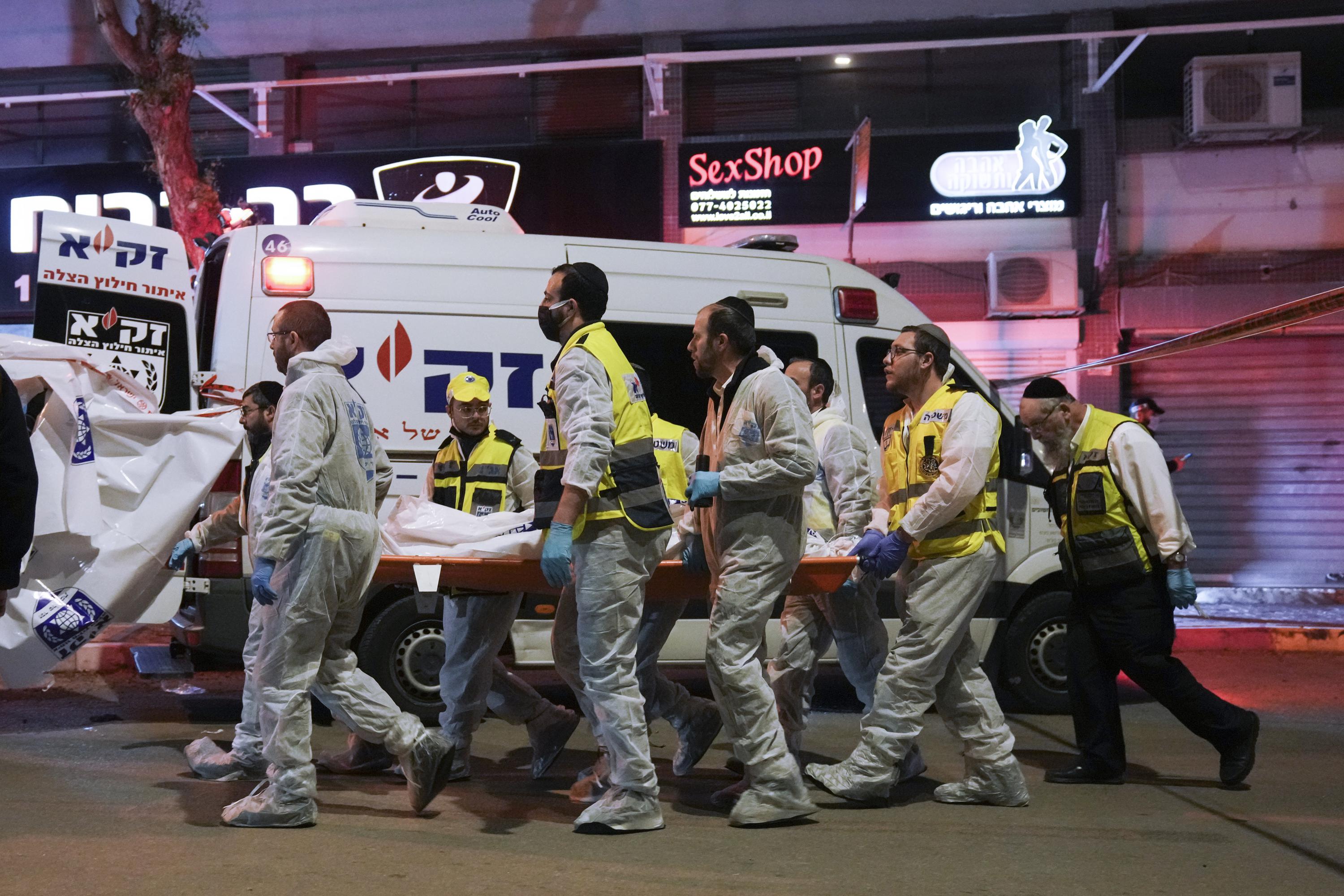Gunmen kill 2 in central Israel attack, Israeli police say | AP News