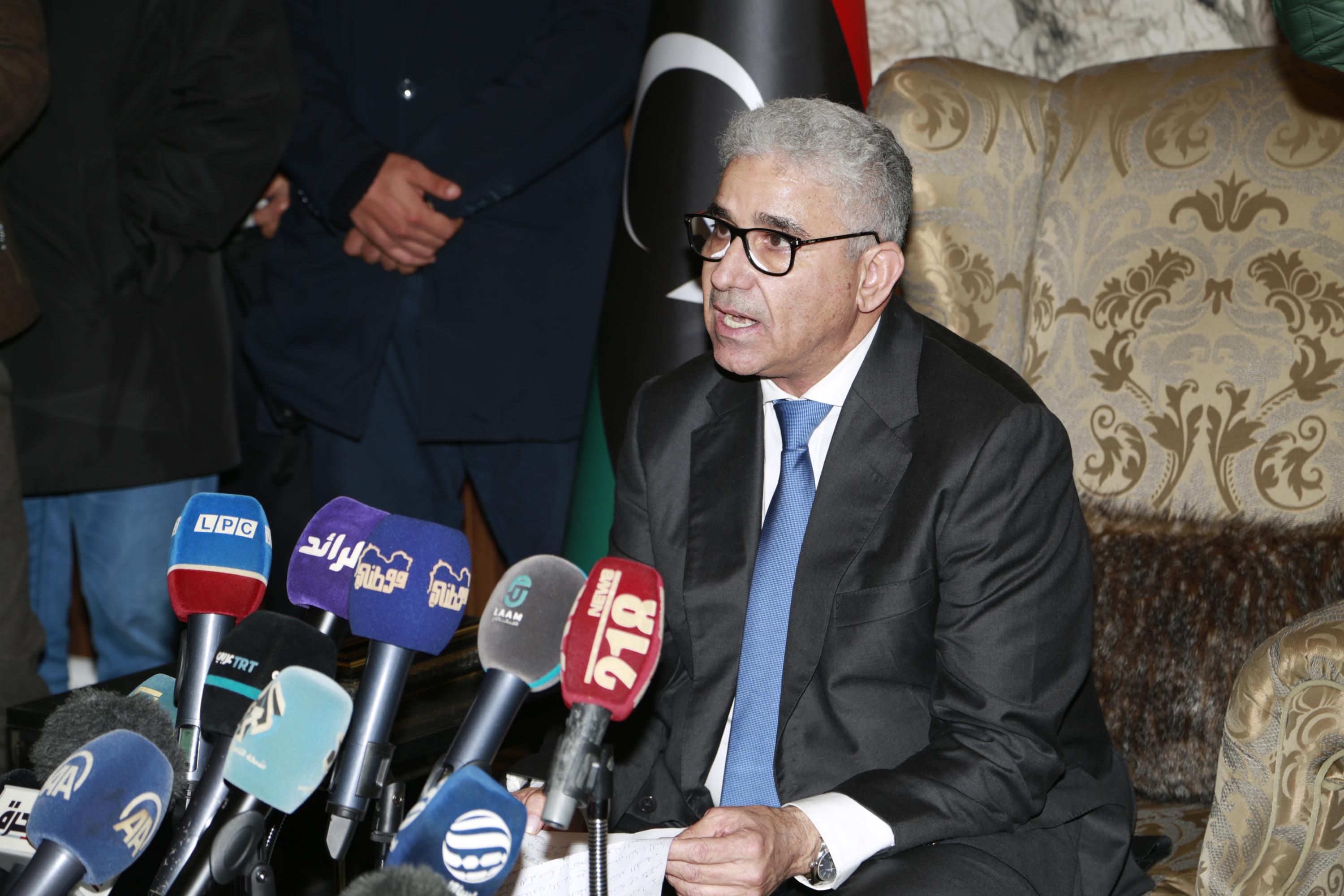 Rival Libyan premier says he plans to be in Tripoli in days | AP News