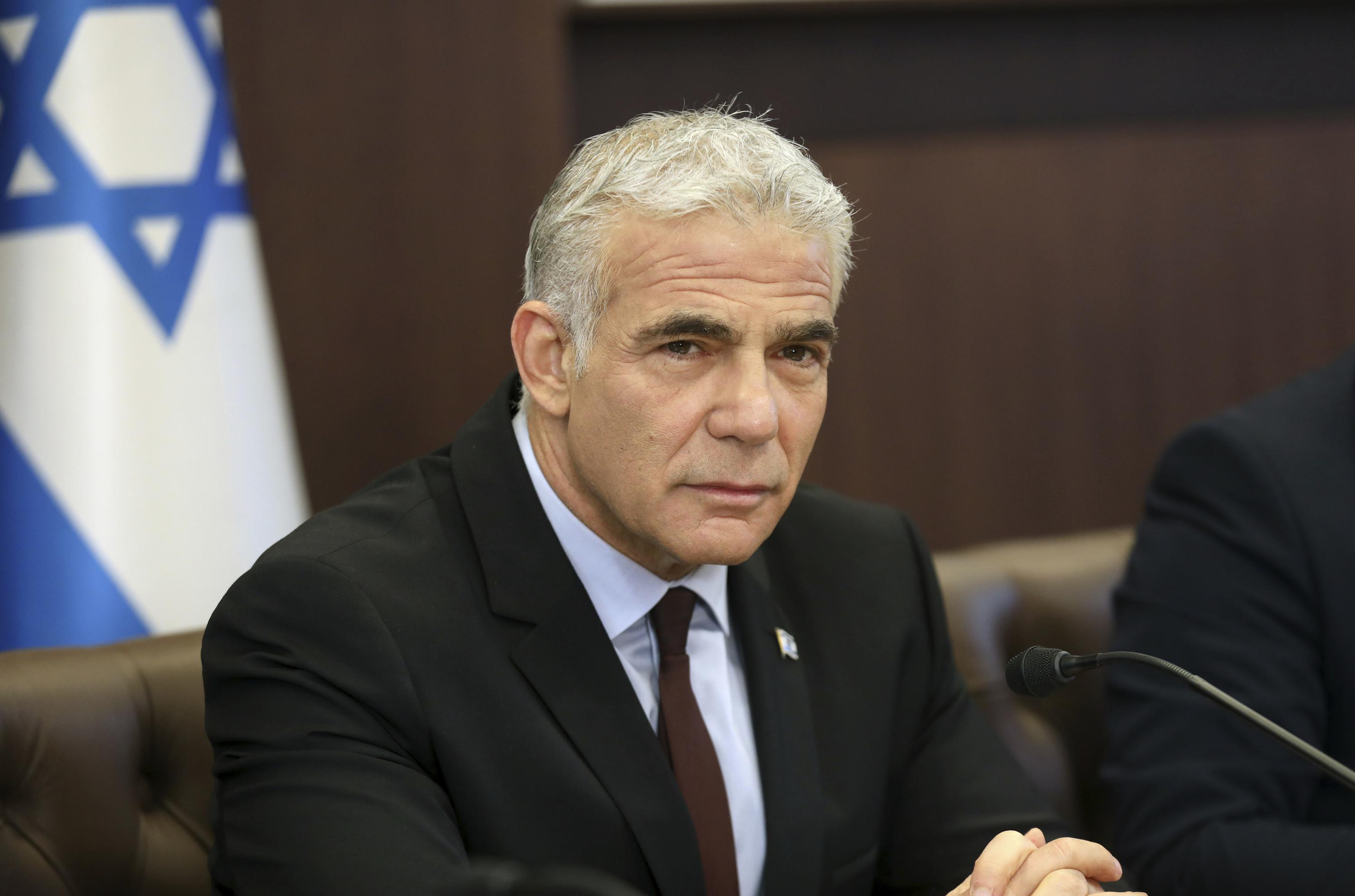 Israel's caretaker PM Lapid holds first Cabinet meeting | AP News