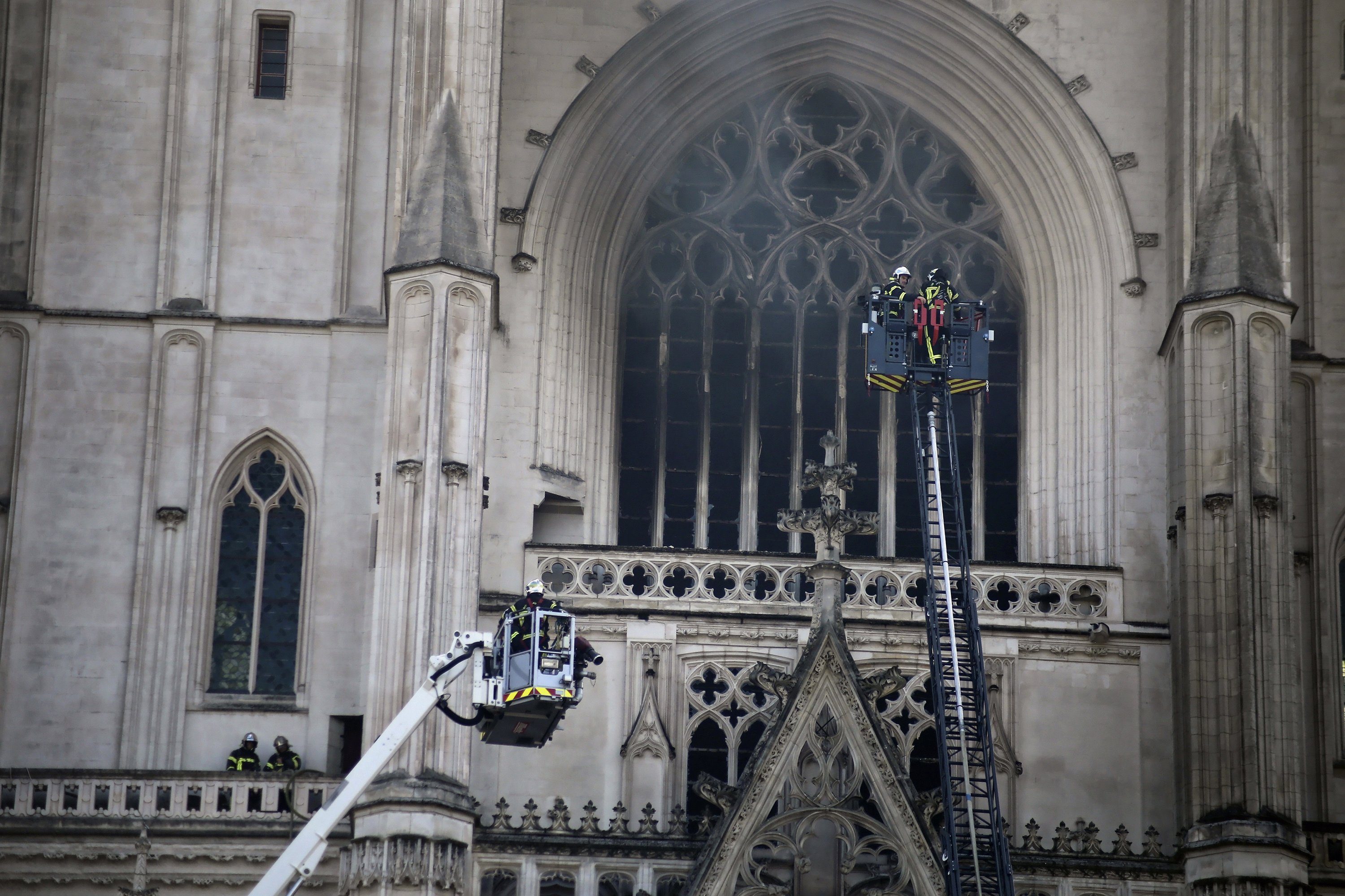 Church volunteer admits to arson attack on French cathedral | AP News