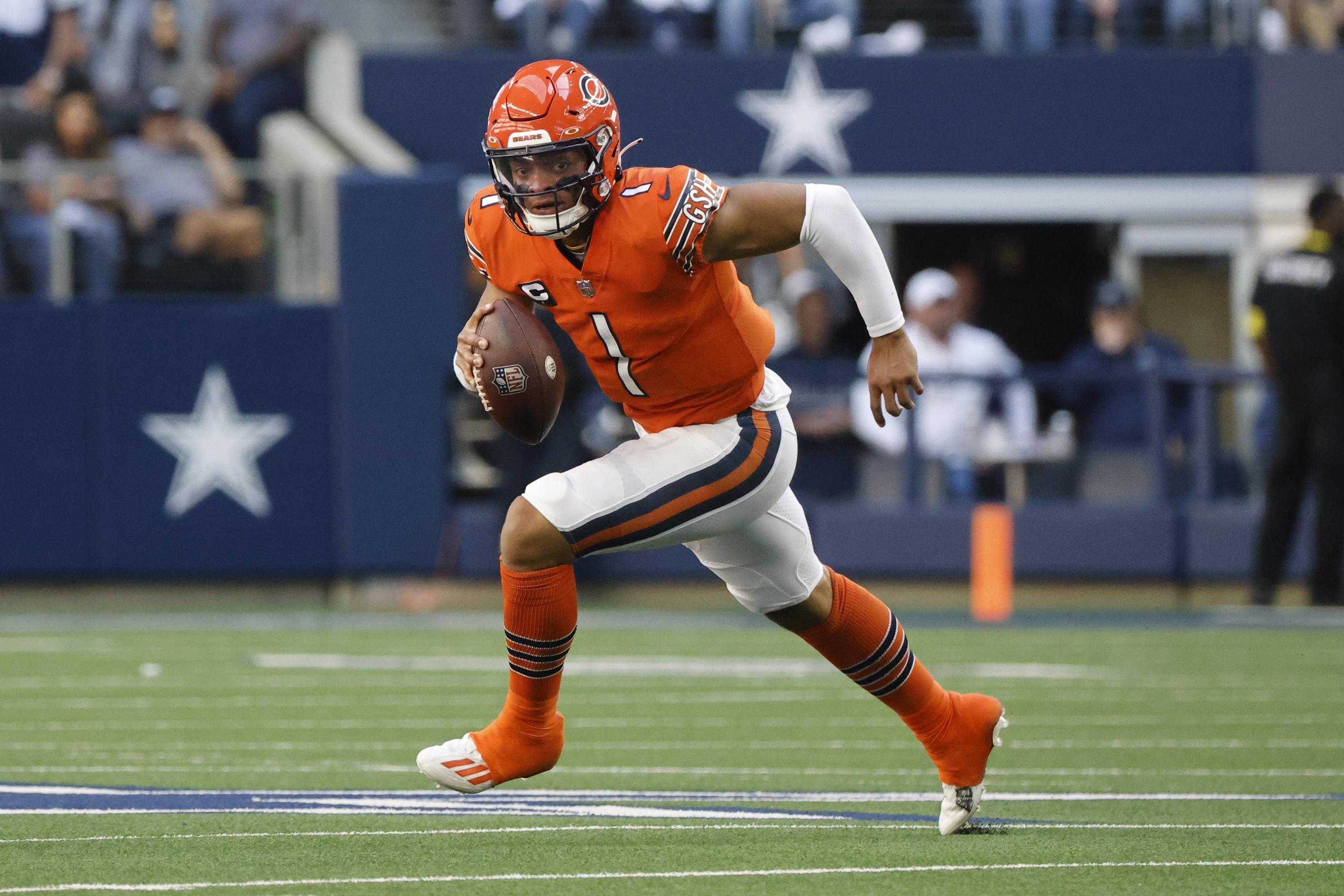 Fields' lapse on fumble costs Bears in loss to Cowboys | AP News