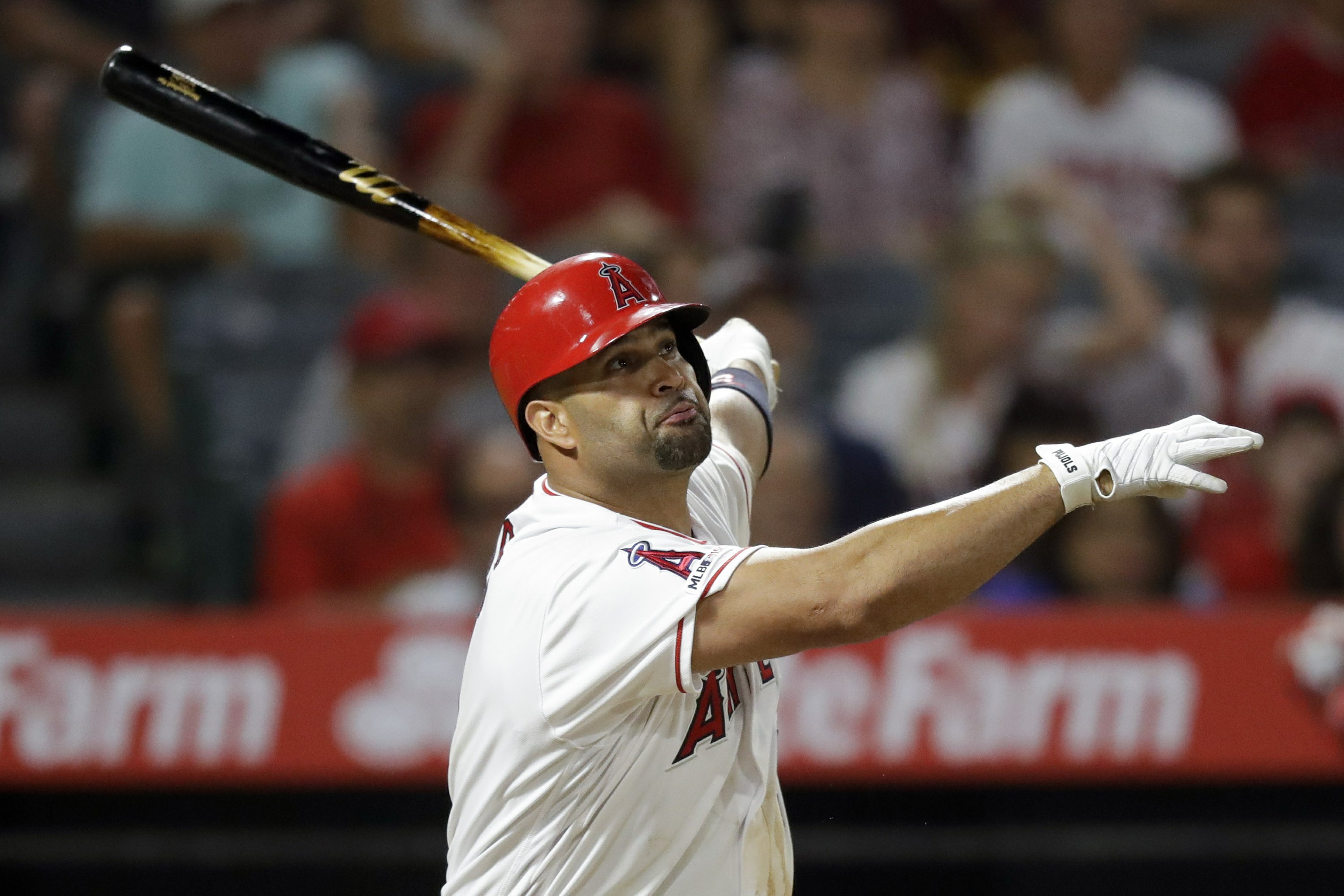 Pujols y Trout lideran el triunfo de Angelinos sobre Boston | AP News