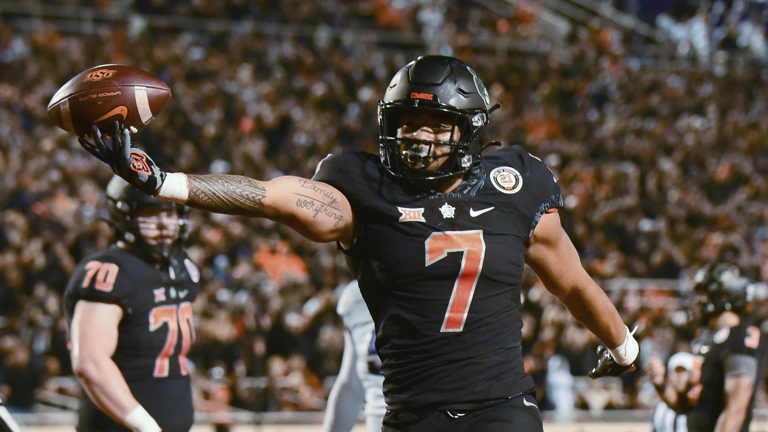 Jaylen Warren, No. 10 Oklahoma State roll past TCU, 63-17 | AP News