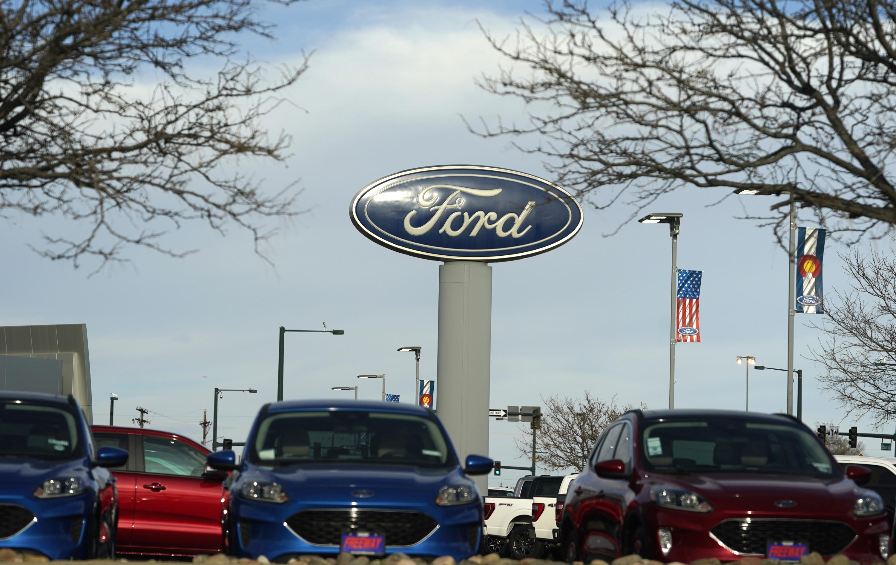Ford, GM profits fall as sales drop due to chip shortage | AP News