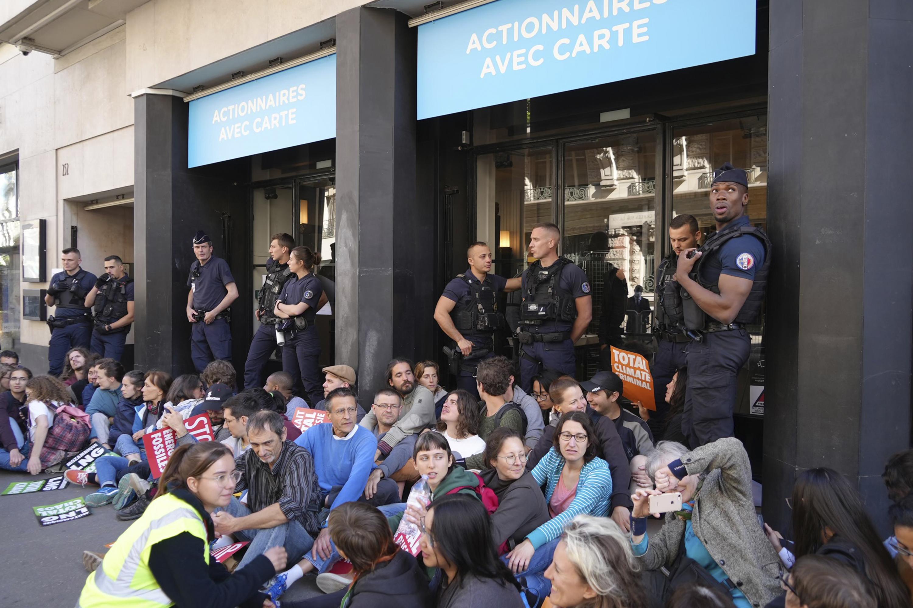 France: Climate protesters block TotalEnergies meeting | AP News
