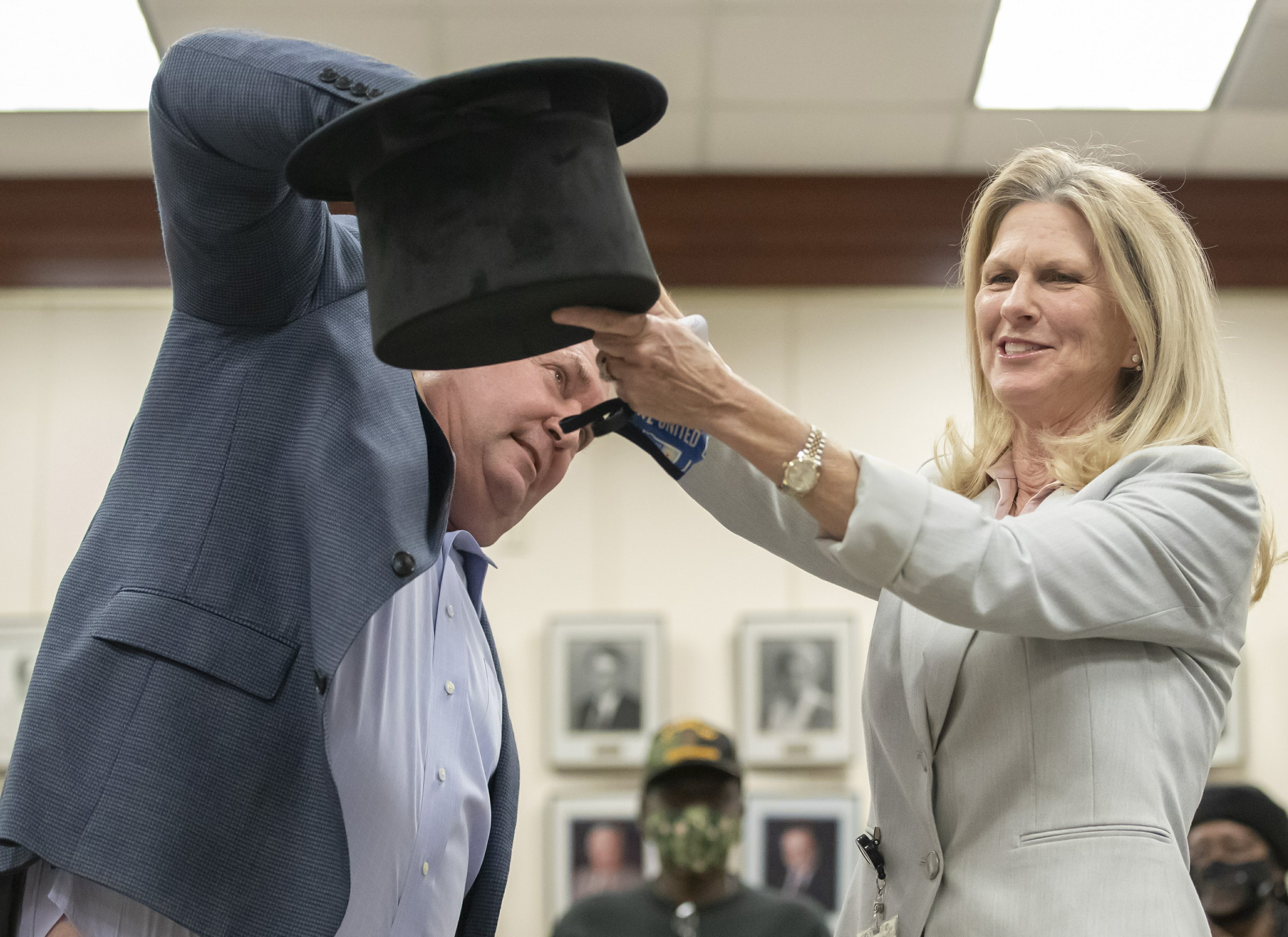 Mayor of Houston suburb chosen by pulling a name from hat | AP News