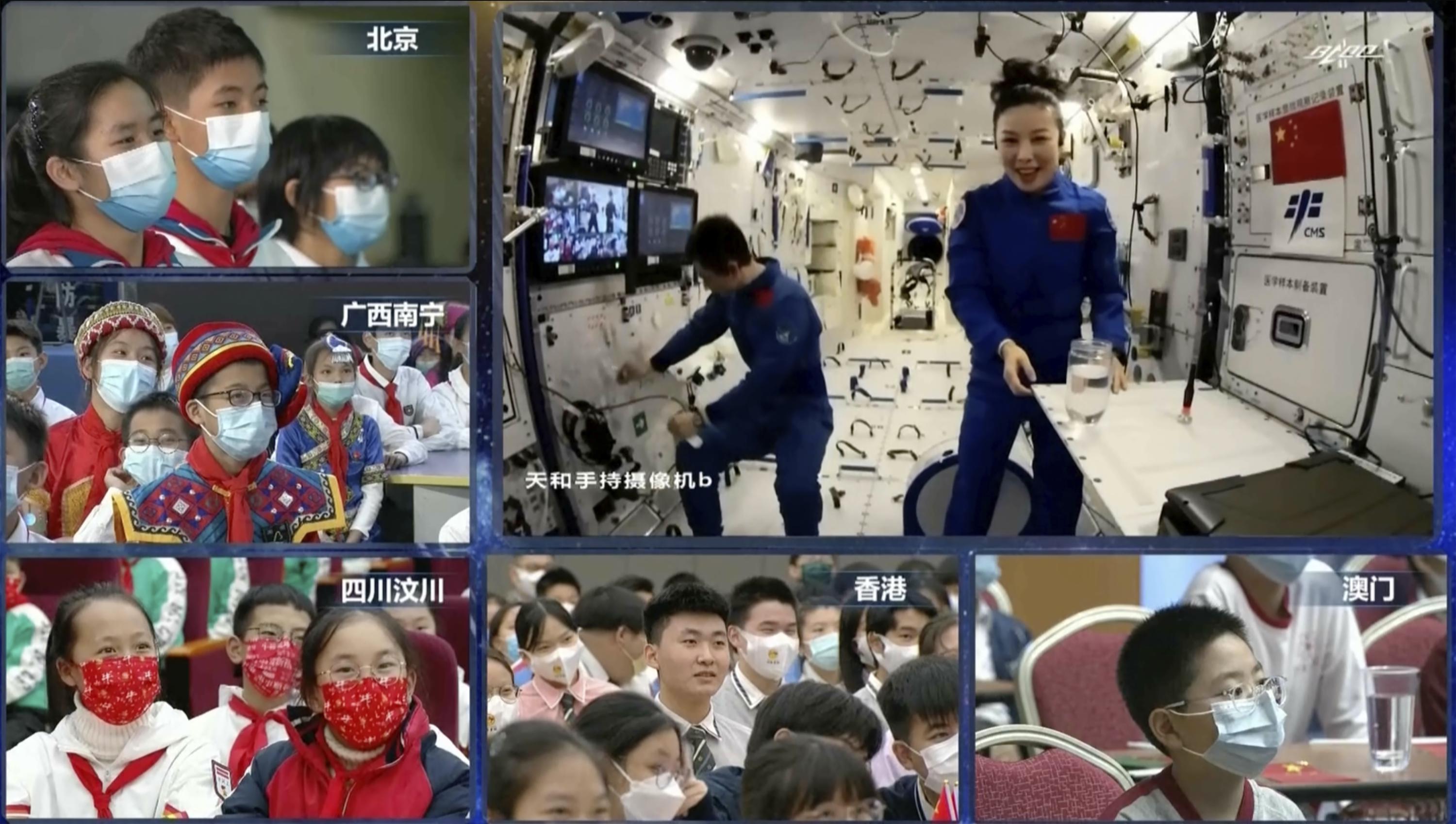 Chinese astronauts give science lesson from space station | AP News