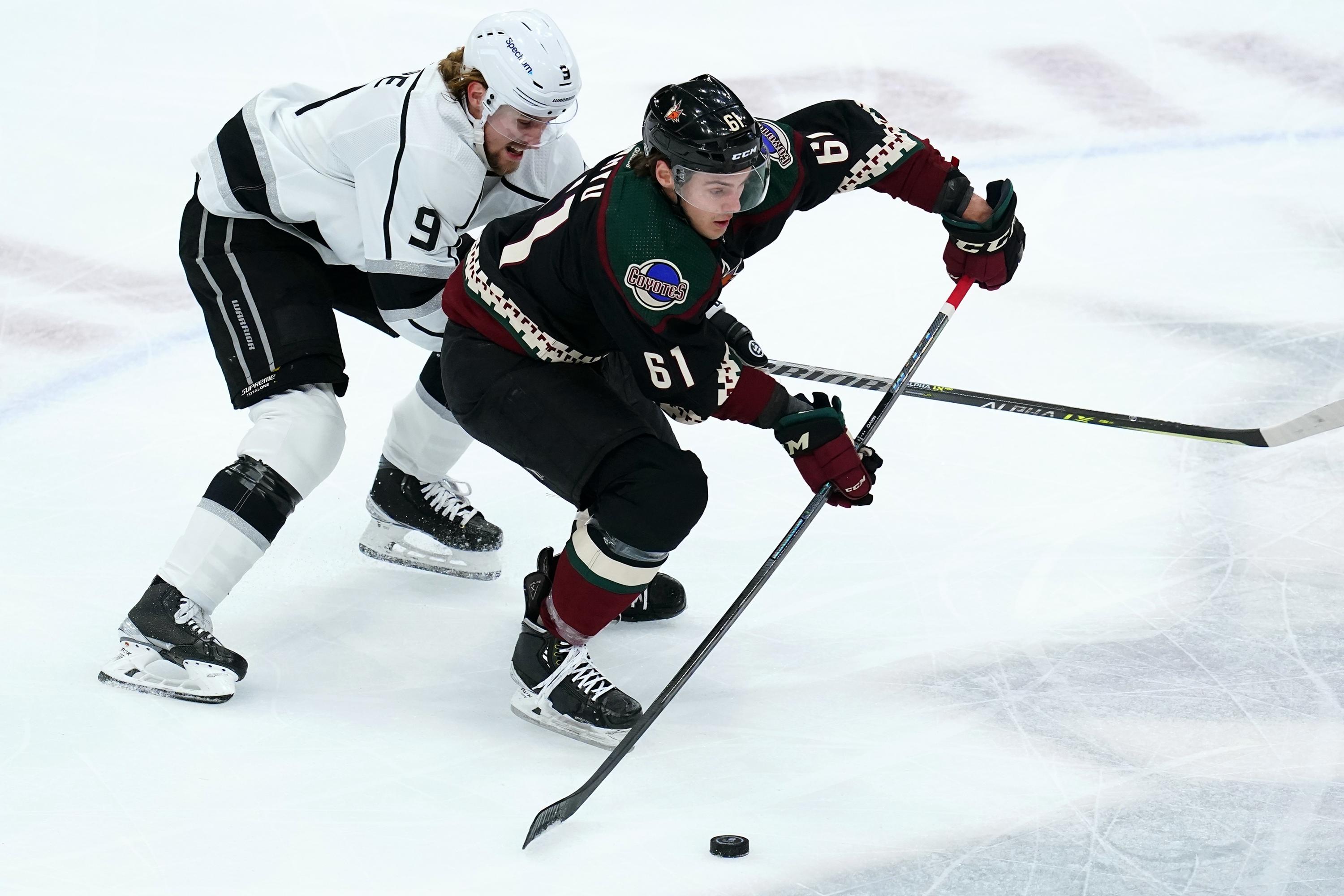 Coyotes sign defenseman Mayo to 3-year contract | AP News