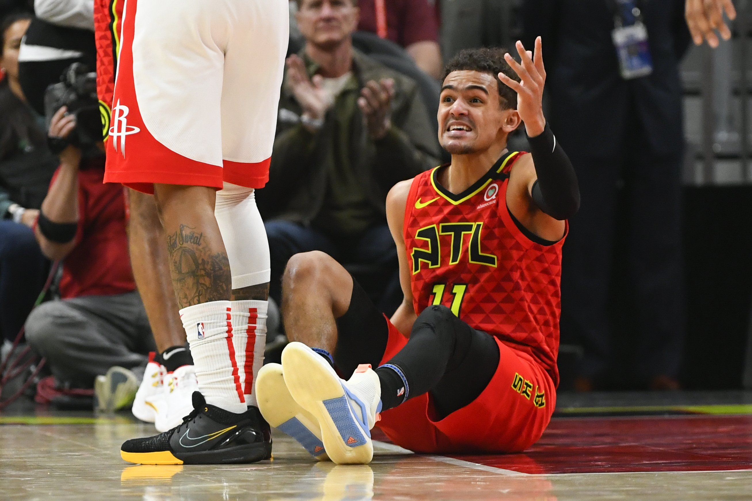 Harden, Young get 40-point triple-doubles; Rockets top Hawks | AP News