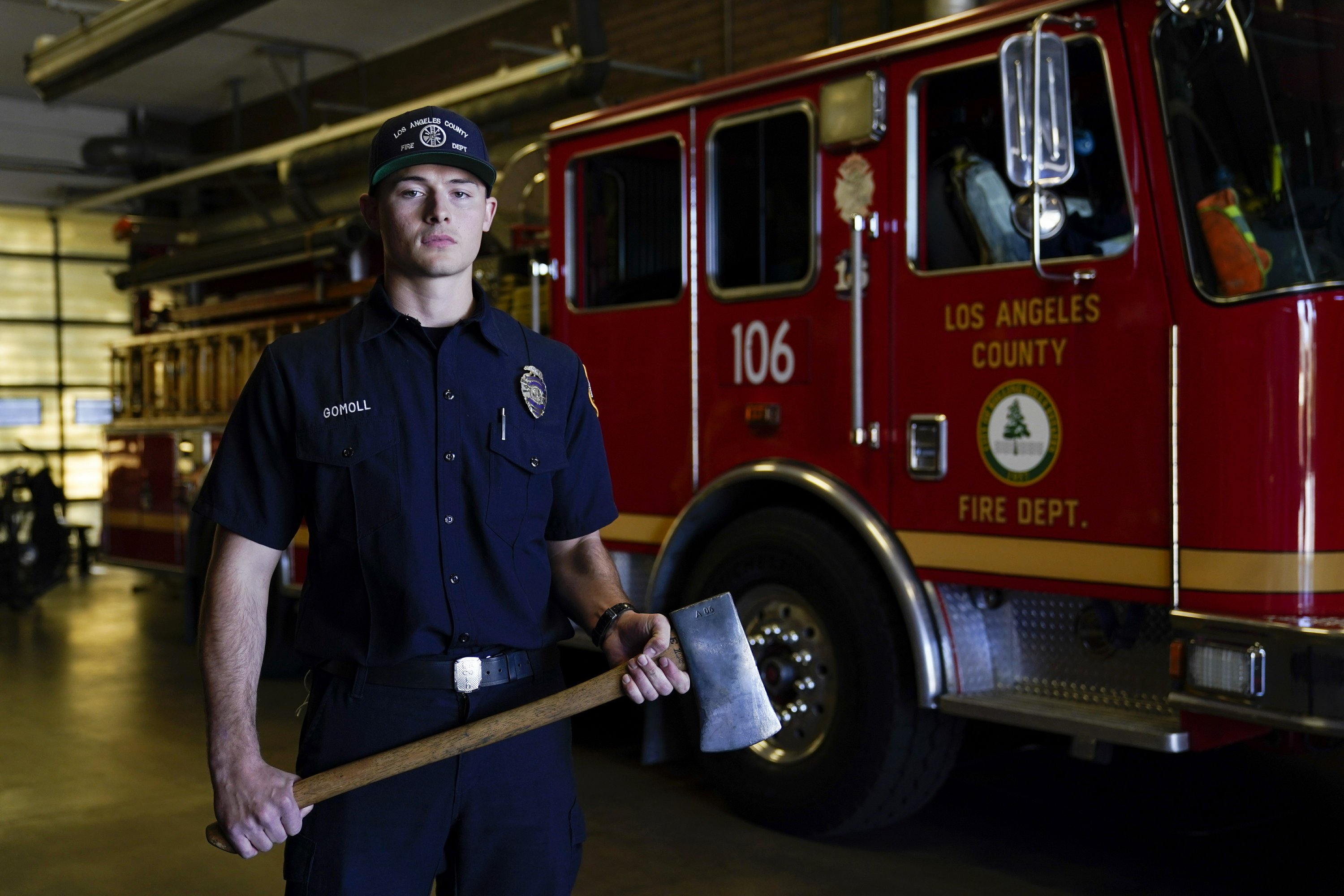 LA firefighters rely on ax, luck to free Woods from crash | AP News