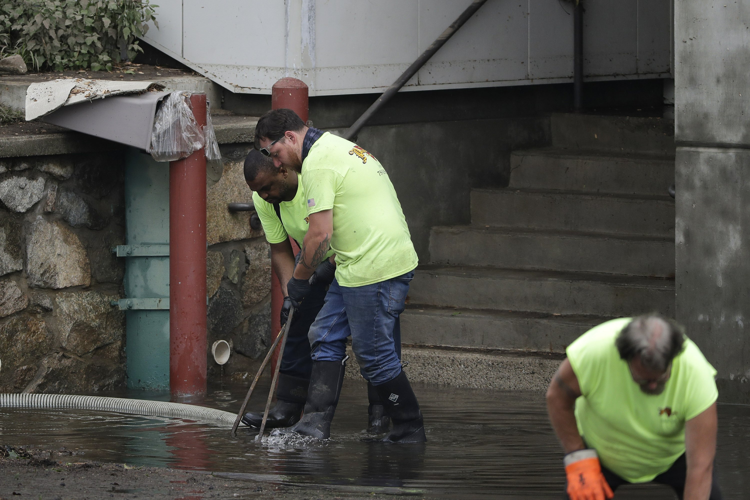 Rain, floods force temporary closure of hospital | AP News