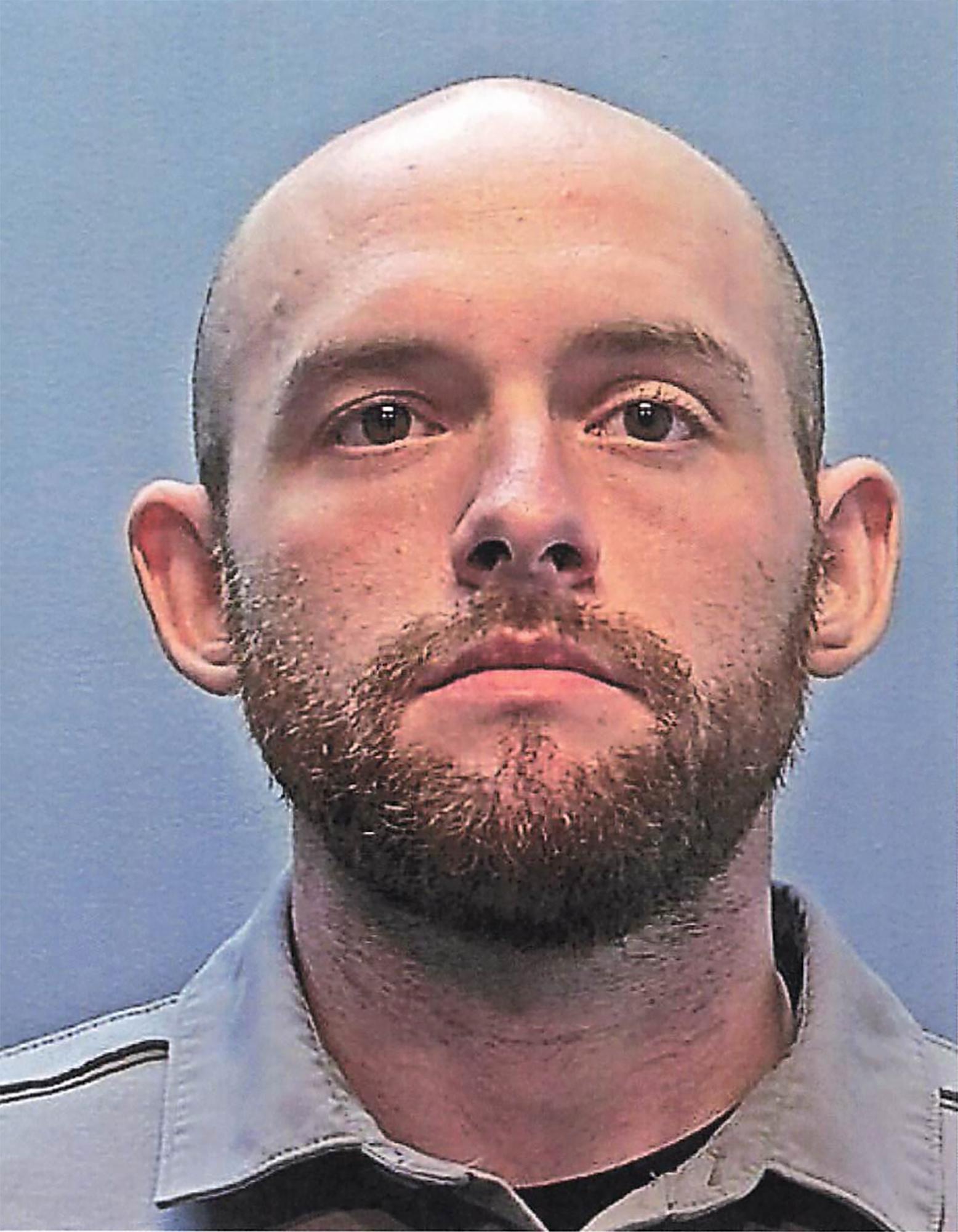 Lawsuit by Colorado cop fired in photo scandal is dismissed | AP News