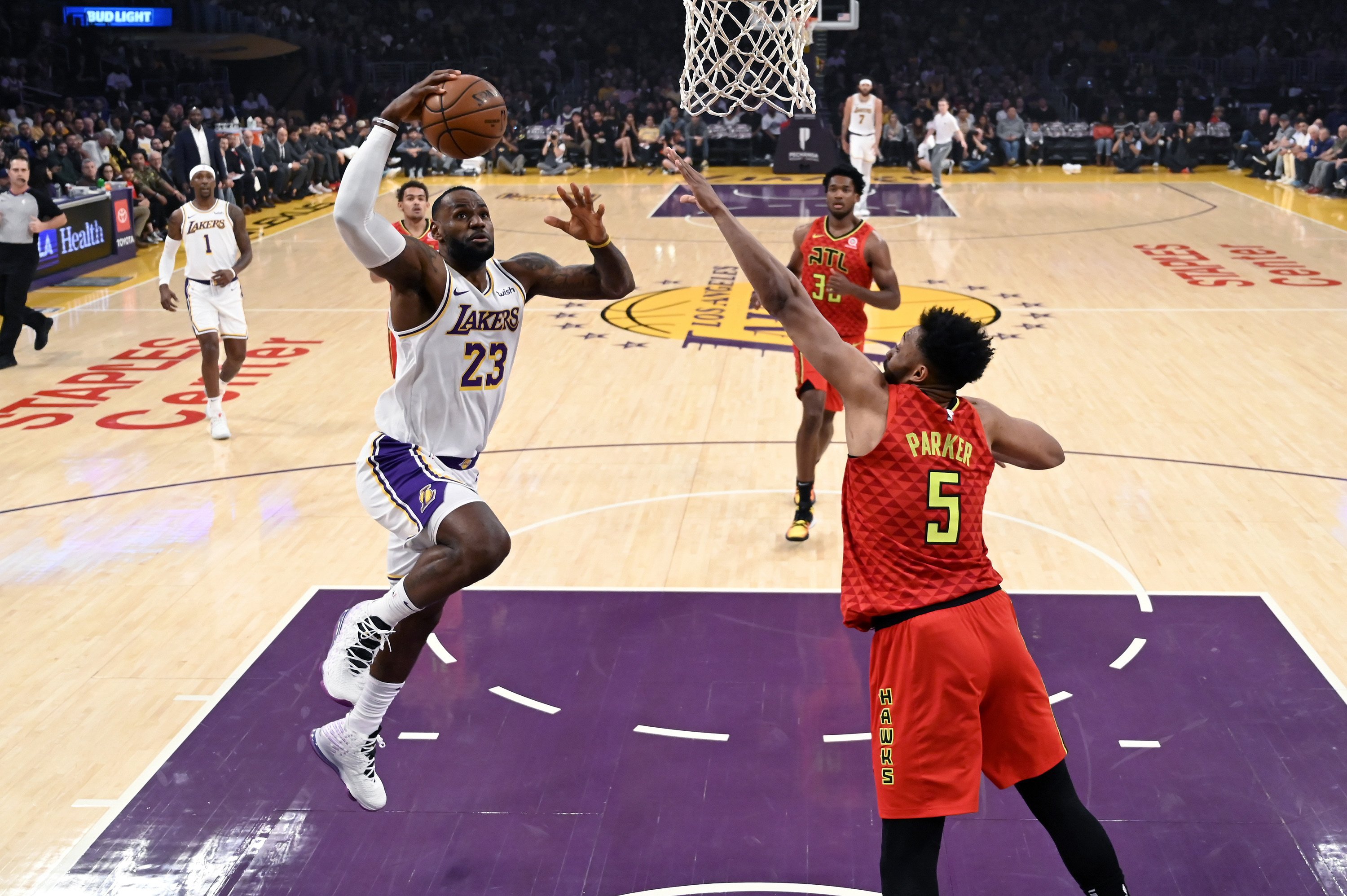 James, Lakers start fast in racing past Hawks 122-101 | AP News