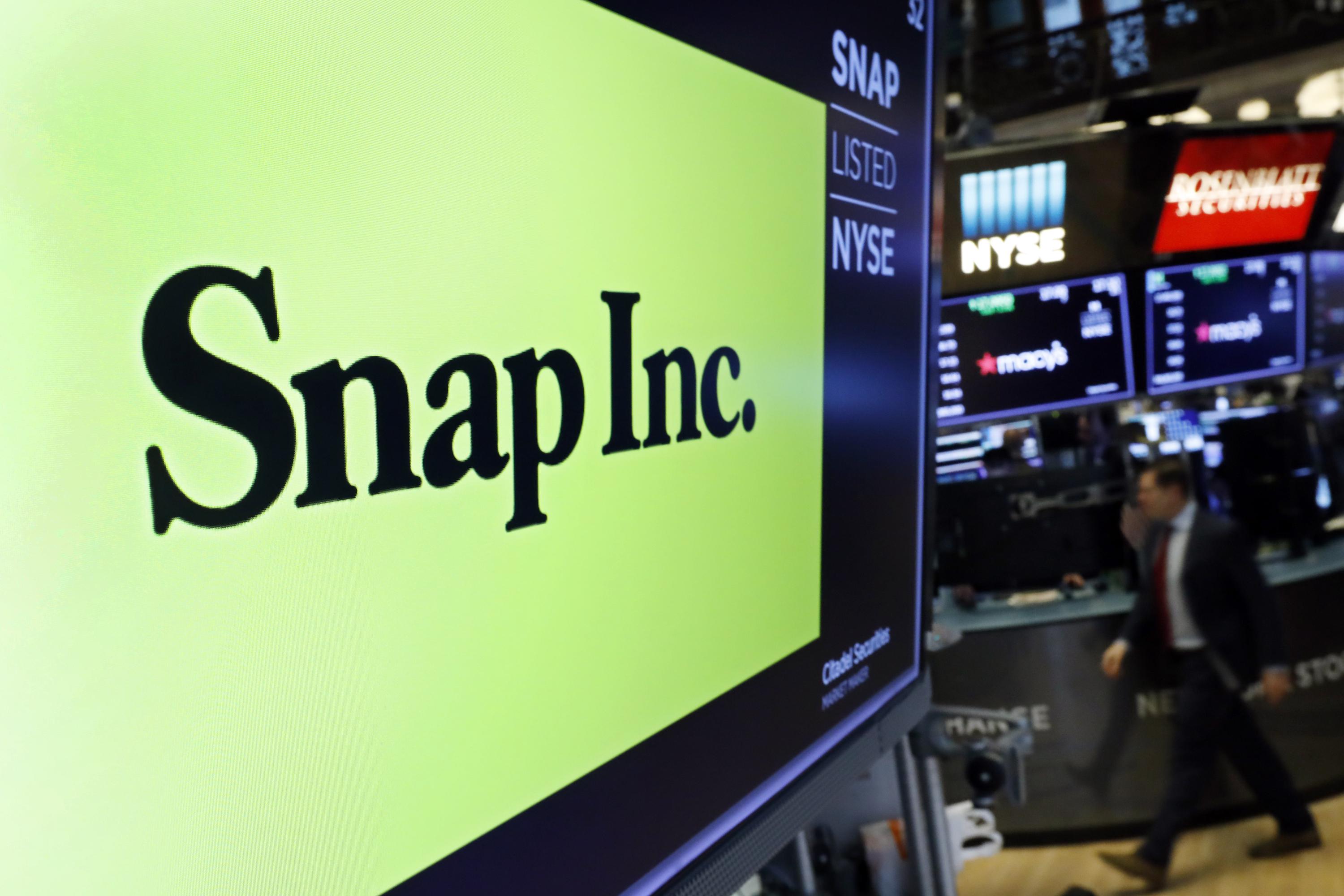 Snap cutting 20% of staff as ad sales continue to dry up | AP News