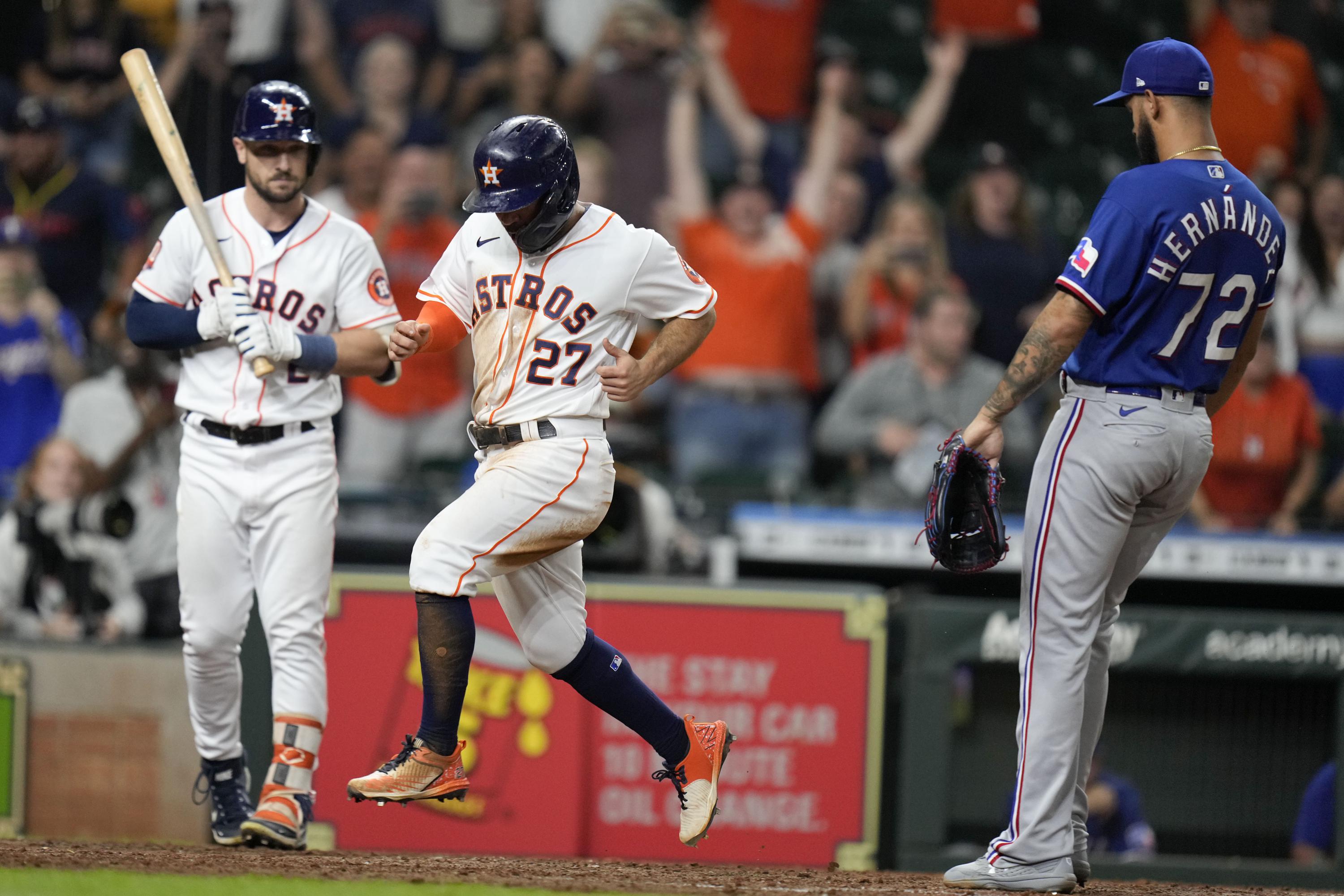 Altuve scores on wild pitch in 10th, Astros beat Texas 4-3 | AP News