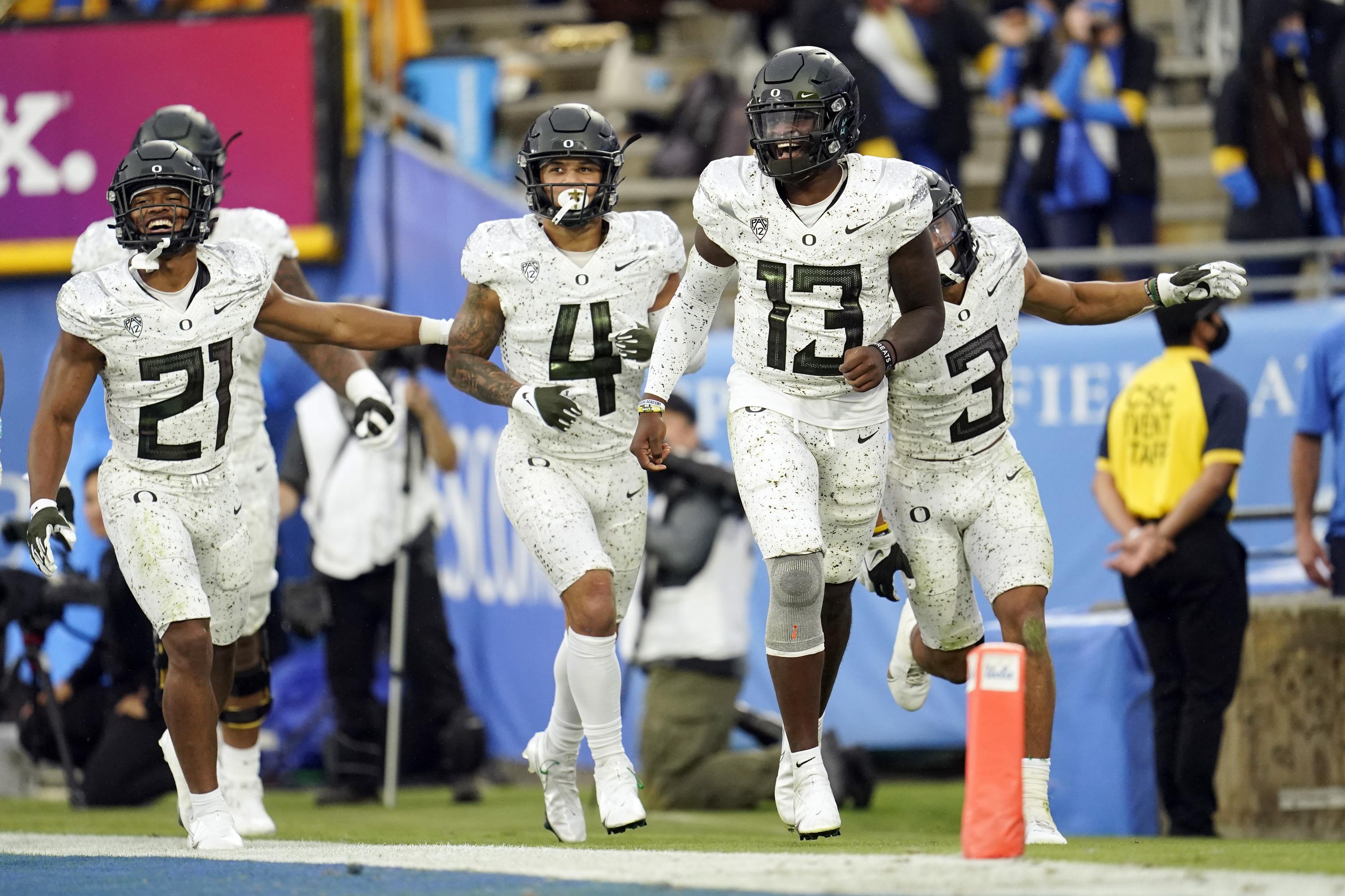 Oregon opens at No. 4 in CFP rankings, travels to Washington | AP News