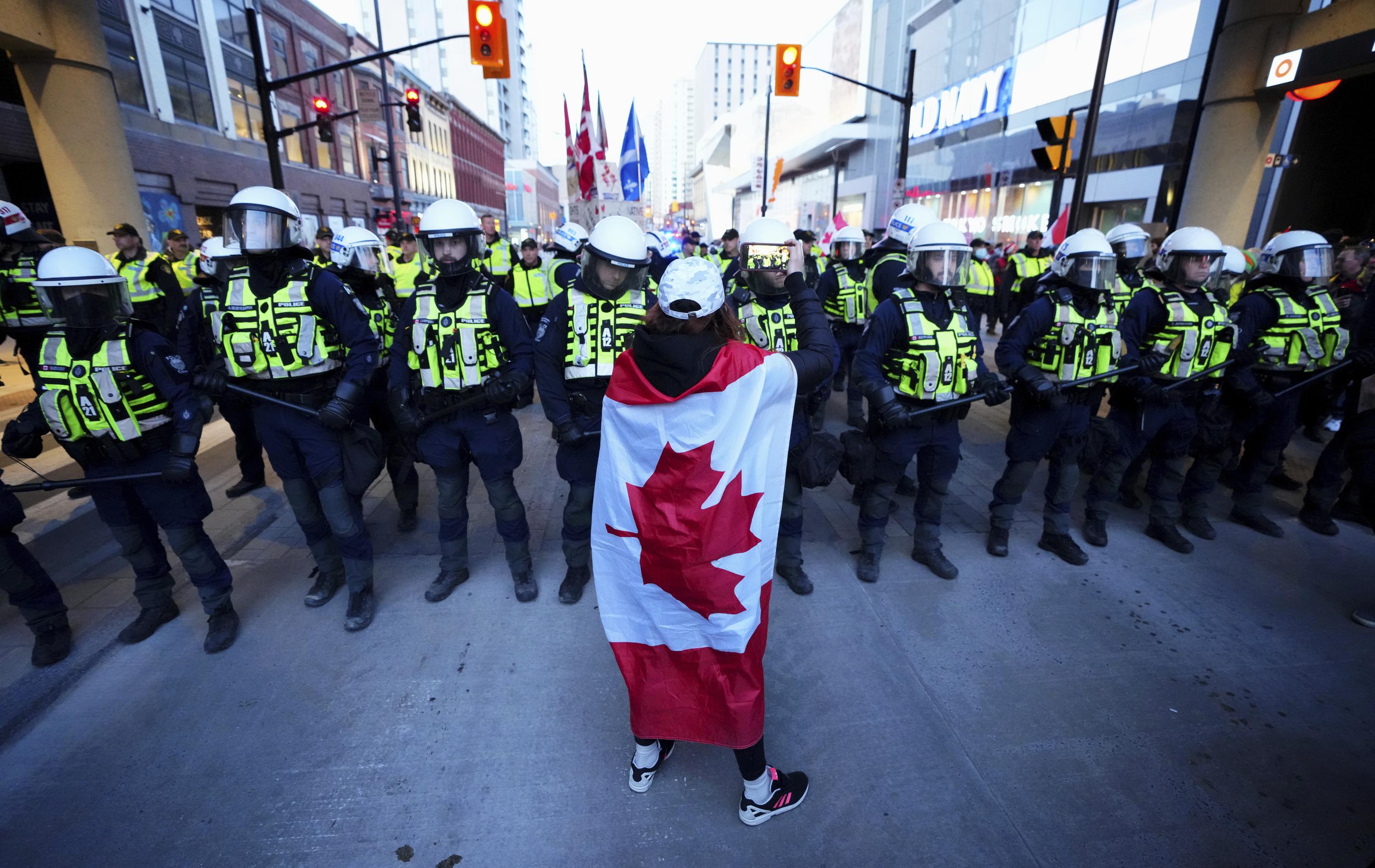Canadian police face off with protesters opposed to mandates | AP News