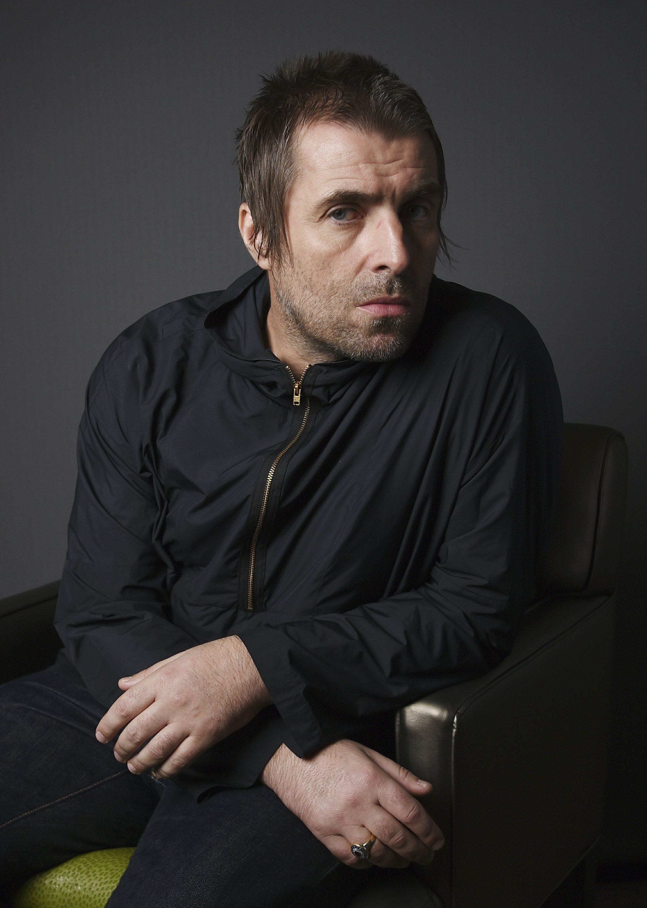 Liam Gallagher talks solo rise, family feud and rock music | AP News