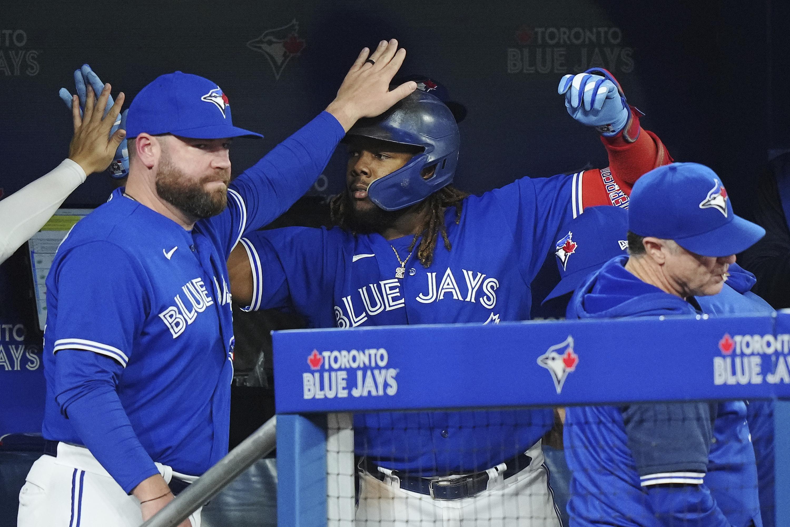 Blue Jays clinch playoff berth with Orioles' loss to Red Sox | AP News