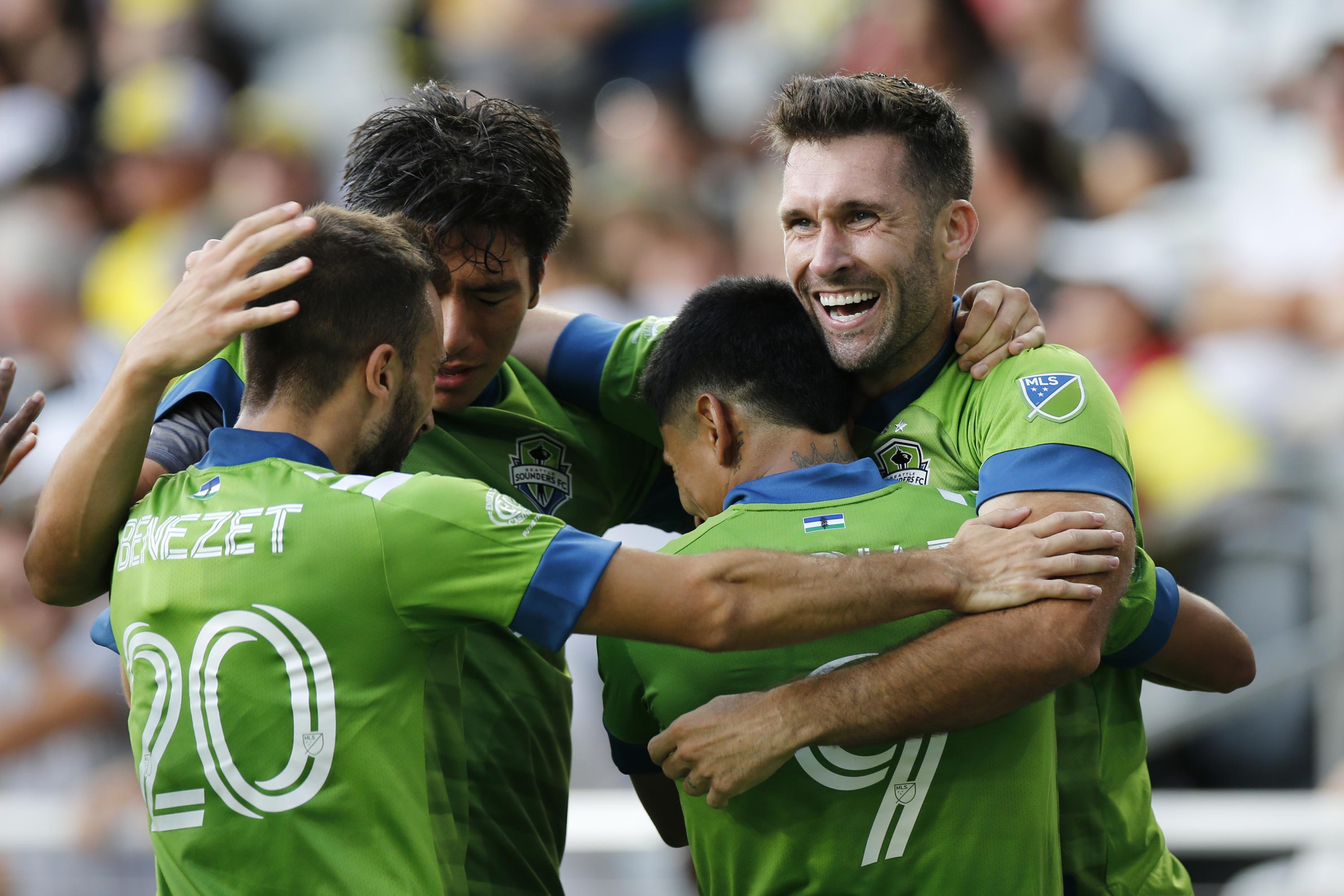 Sounders score twice in final minutes to beat Crew 2-1 | AP News