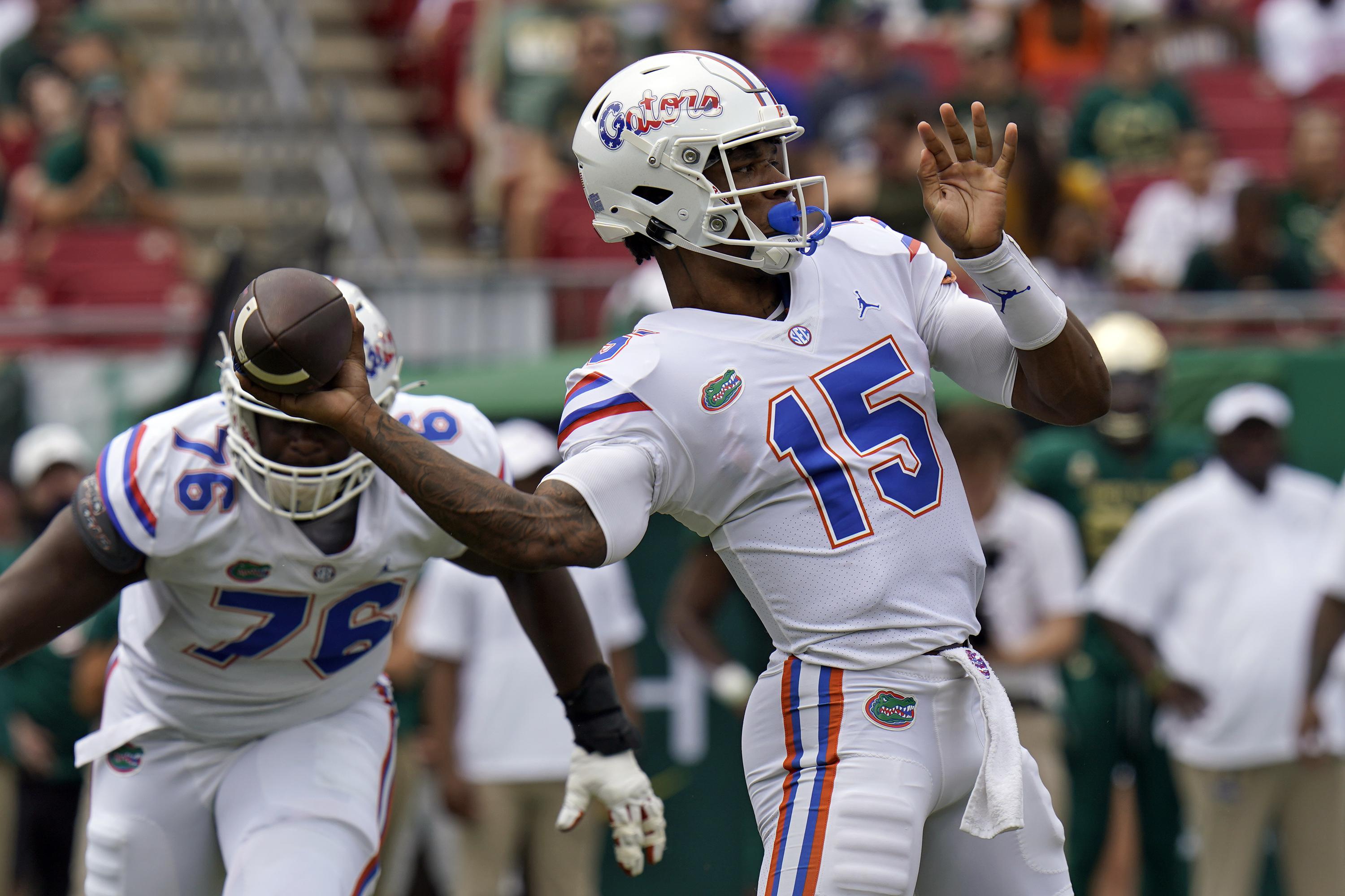 QB debate continues as No. 13 Florida routs USF 42-20 | AP News
