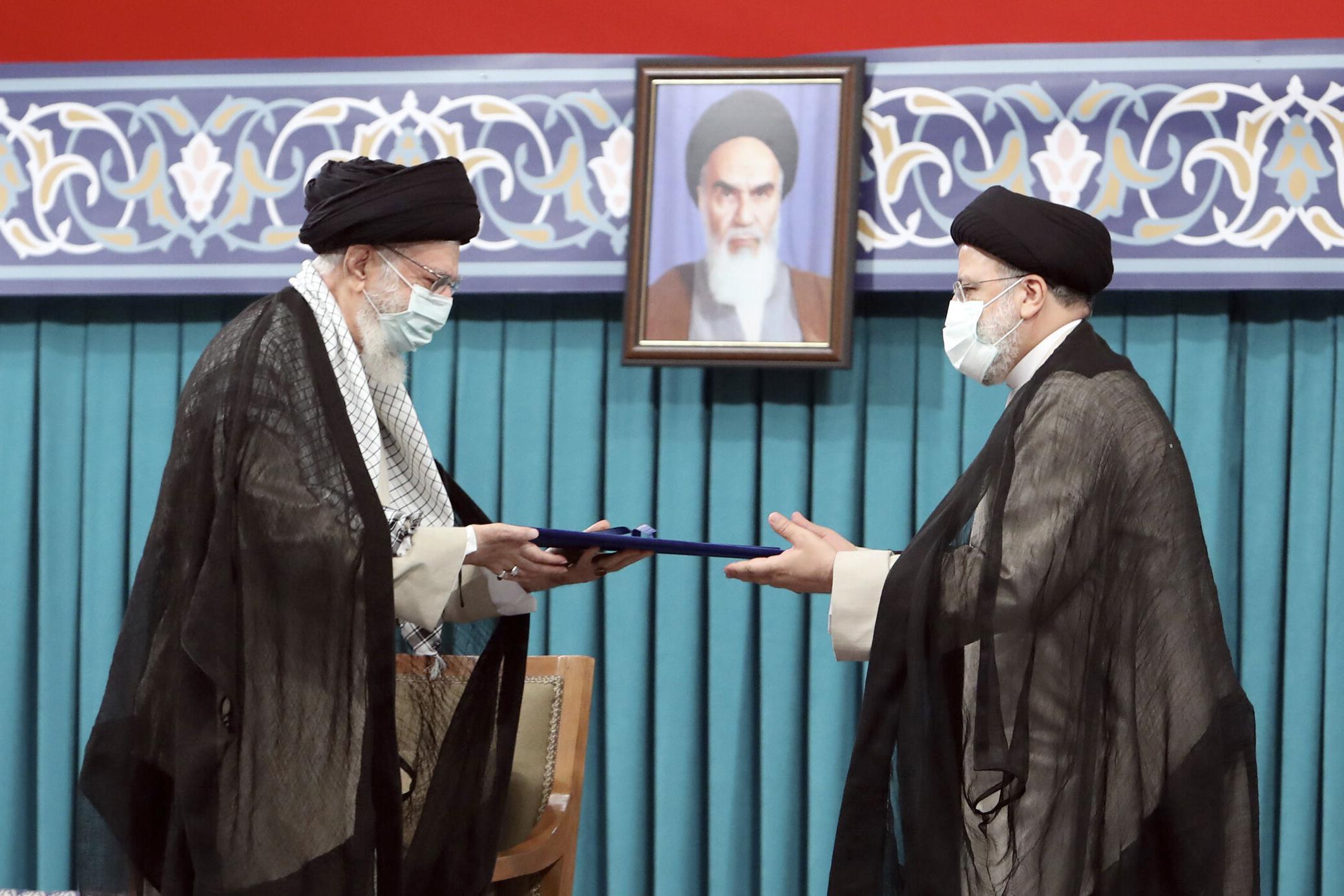 Iran supreme leader endorses hard-line protégé as president | AP News