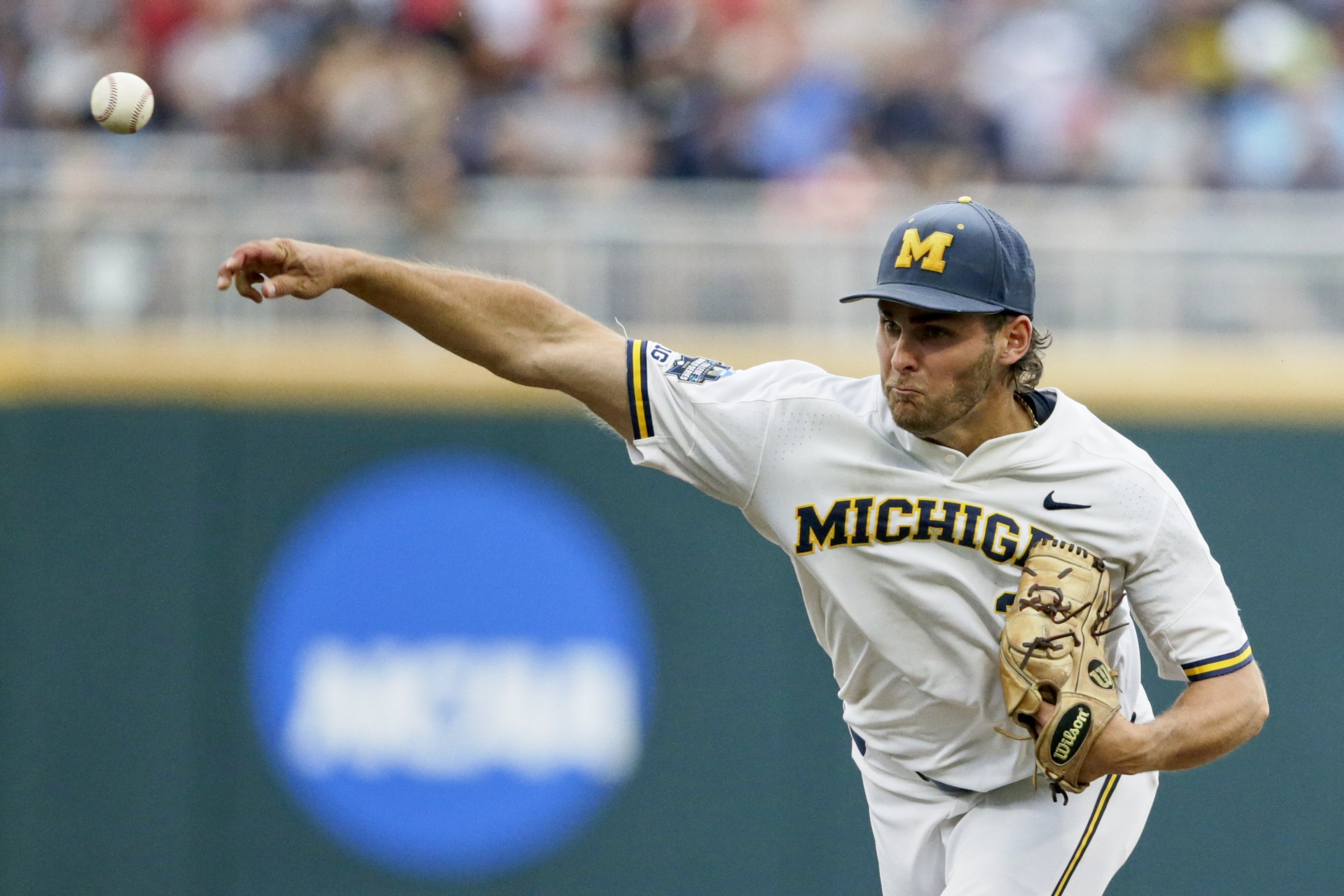 Michigan beats Texas Tech 5-3 in its 1st CWS game since 1984 | AP News
