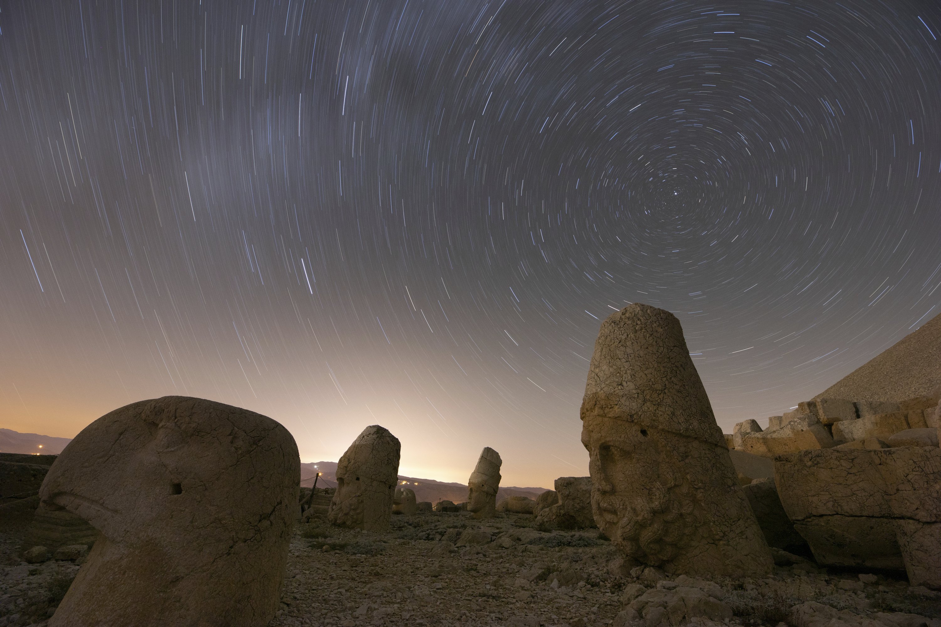 AP PHOTOS: Sunset on Turkey’s massive stone heads